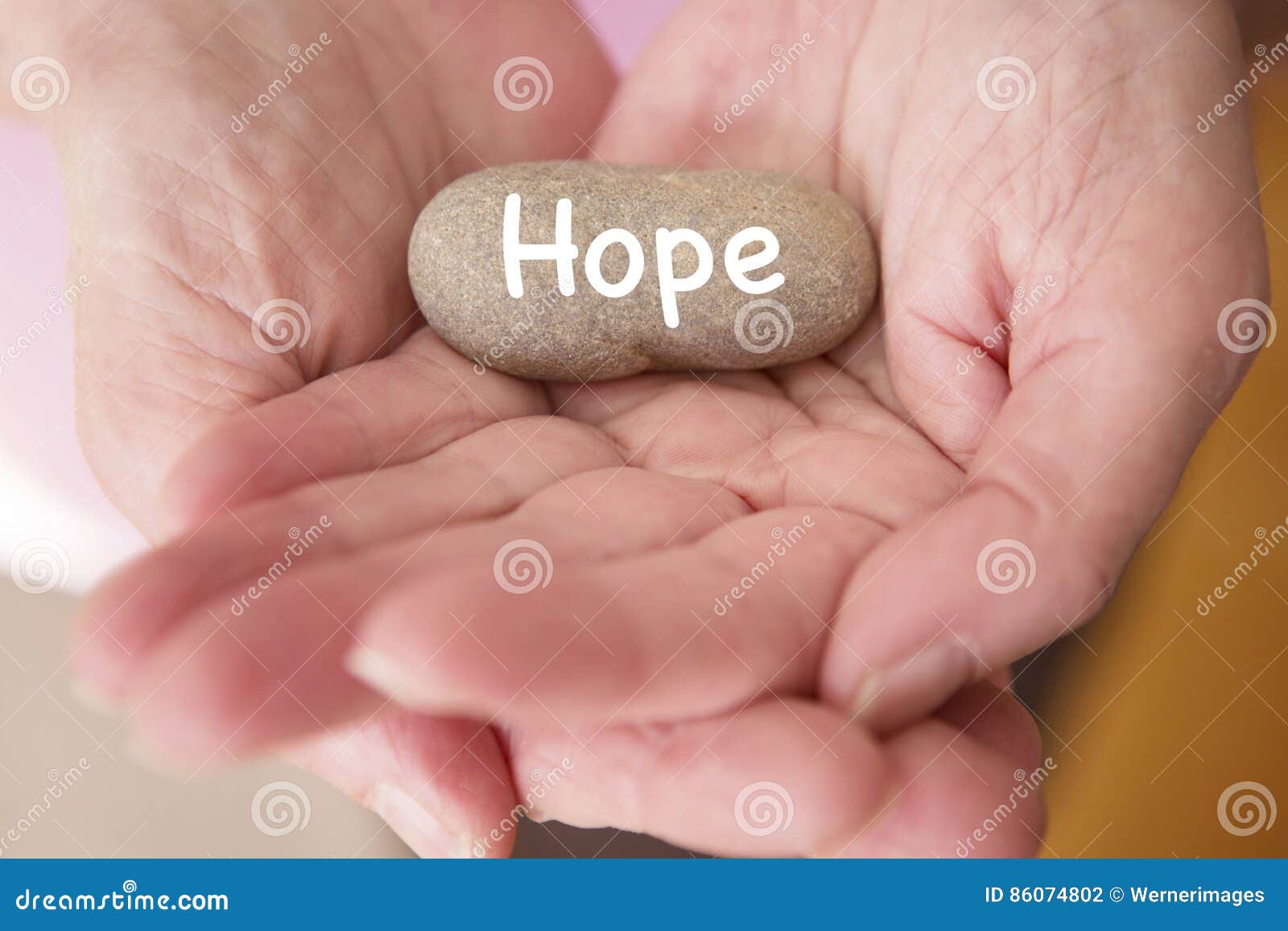 Closeup of Womans Hands Holding Stone with the Word Hope Stock Photo ...