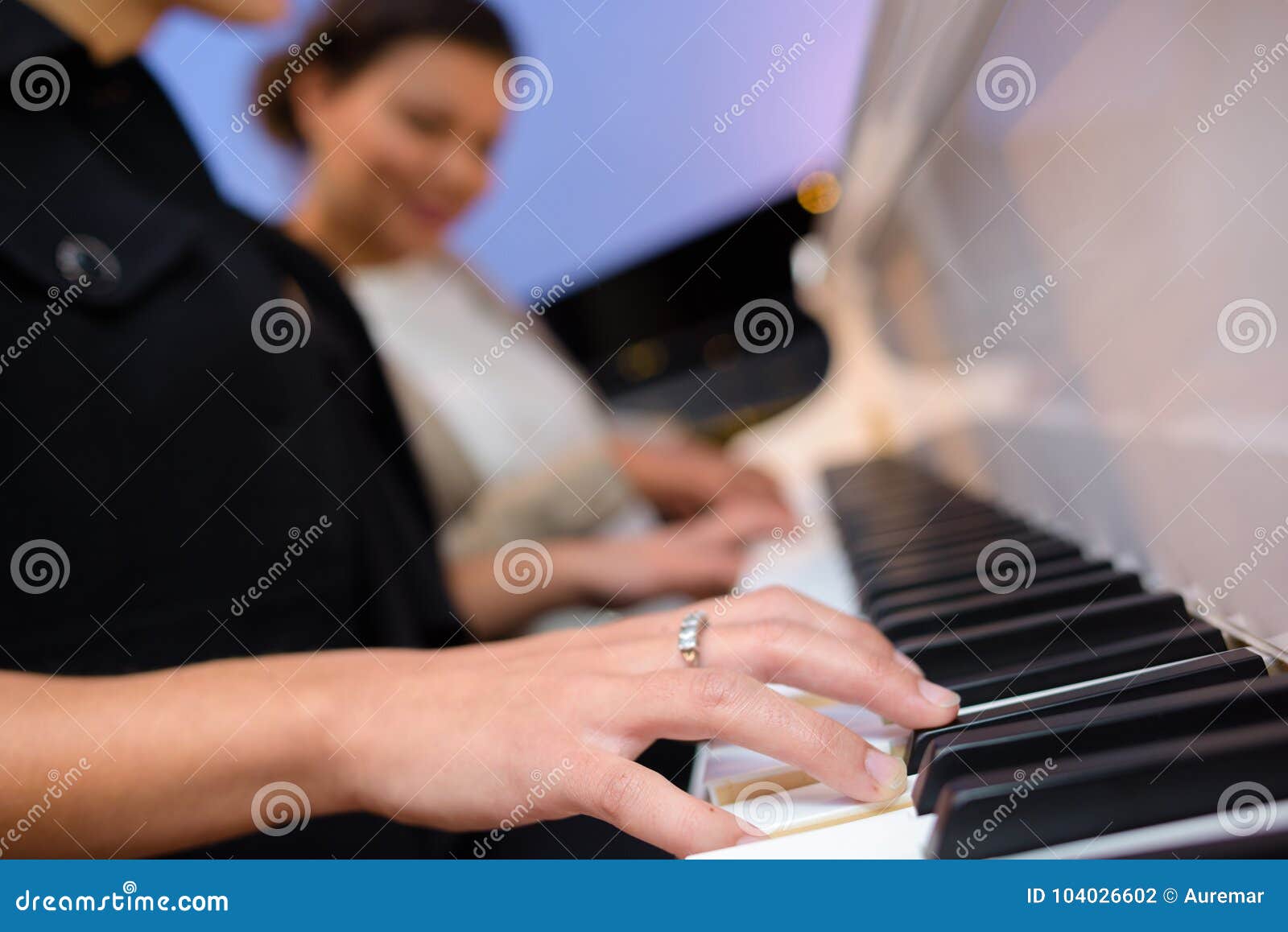 Closeup Women Playing Piano Duet Stock Photo - Image of detail, black ...