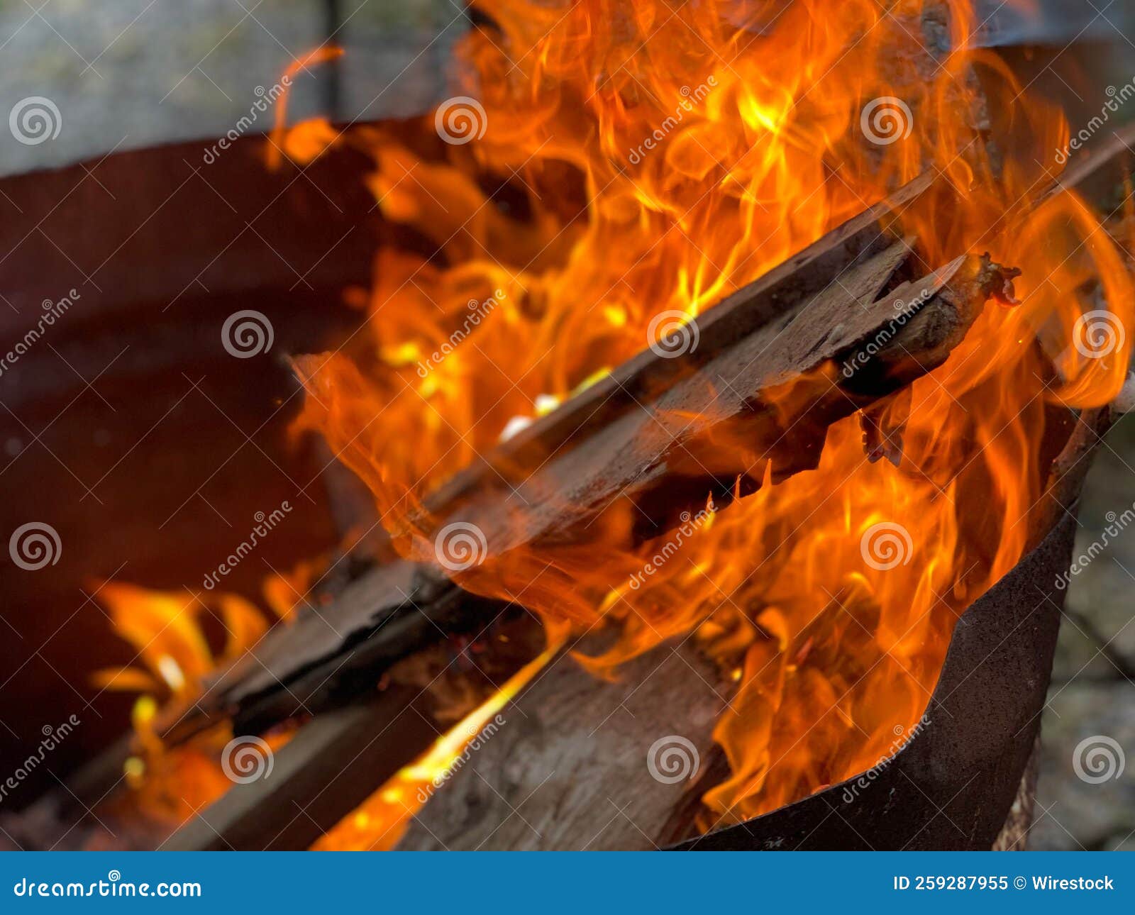 Closeup of a Wood Burning in Fire Flames in a Rusty Metallic Pot Stock ...
