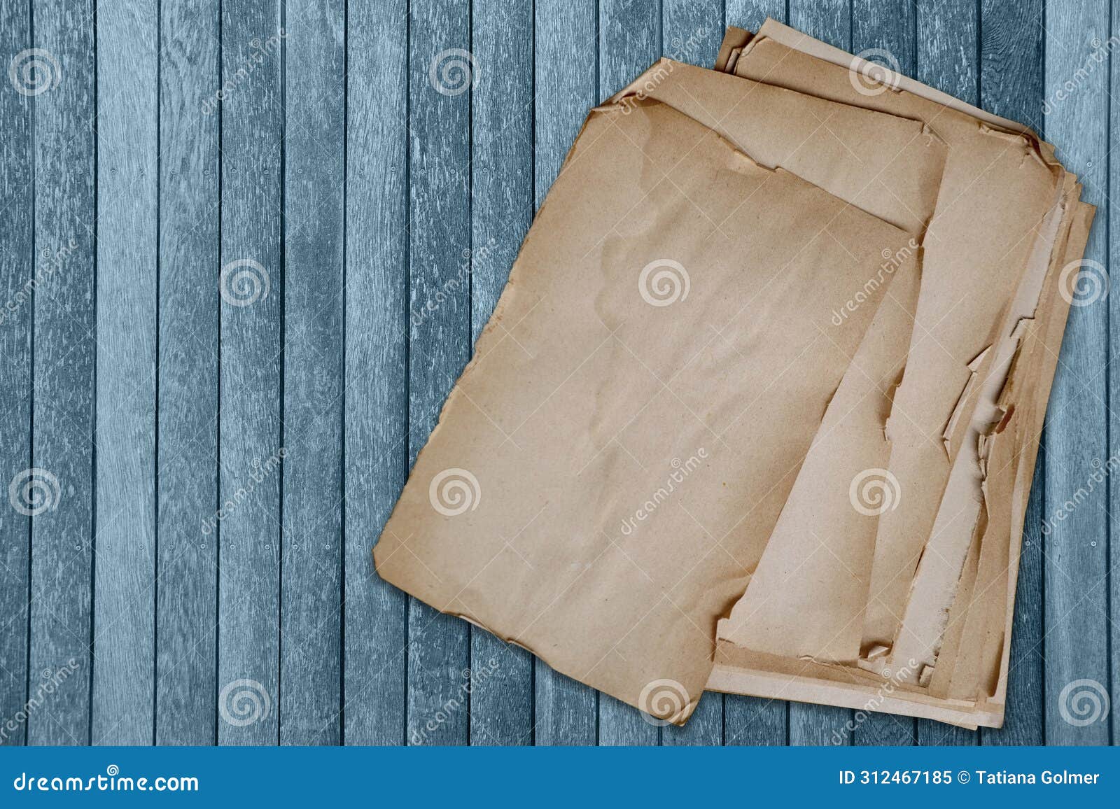 Closeup Wooden Desk with Stack of Old Paper Torn Off Edges for Message ...