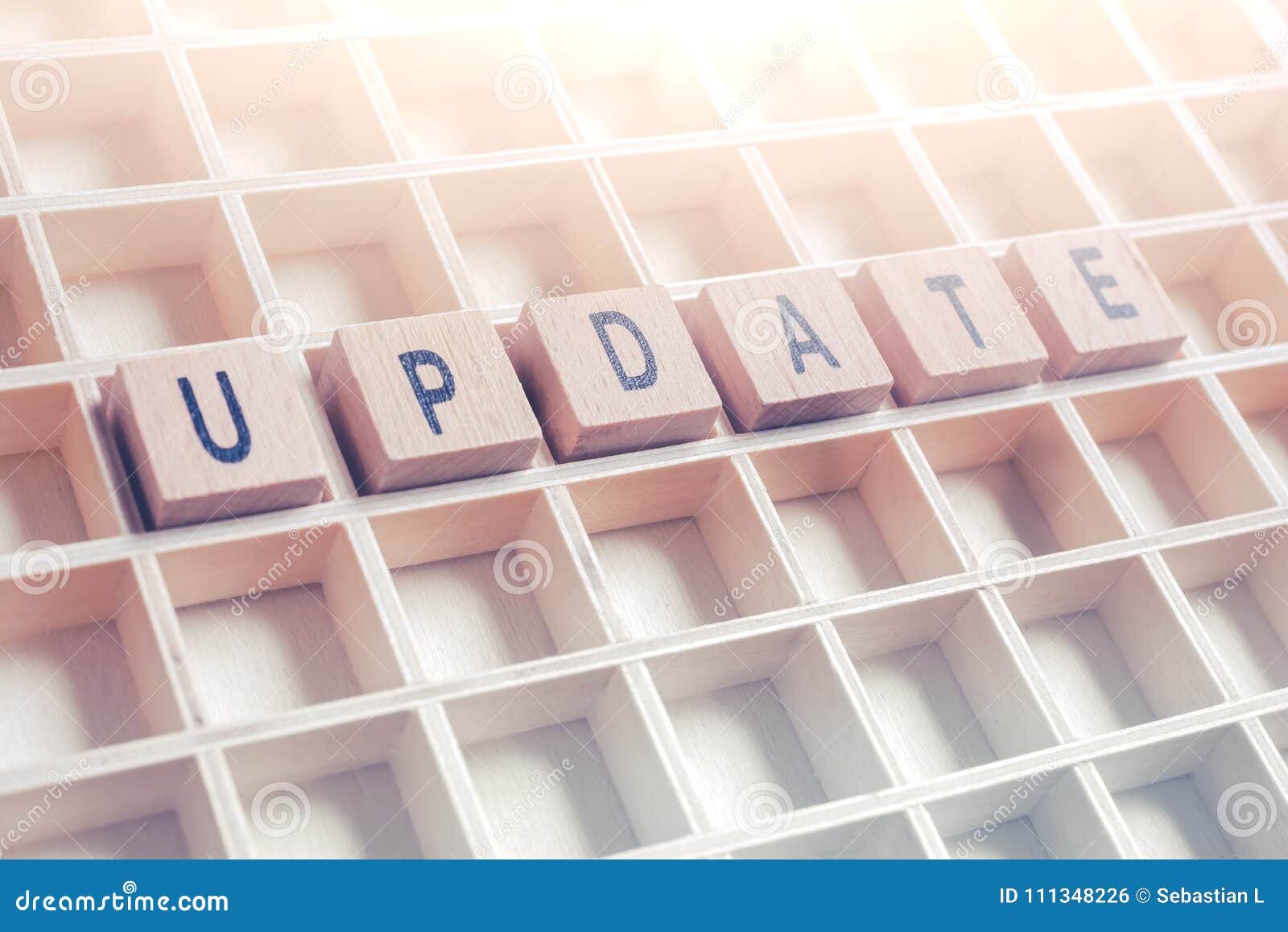 Closeup of the Word Update Formed by Wooden Blocks in a Typecase Stock ...