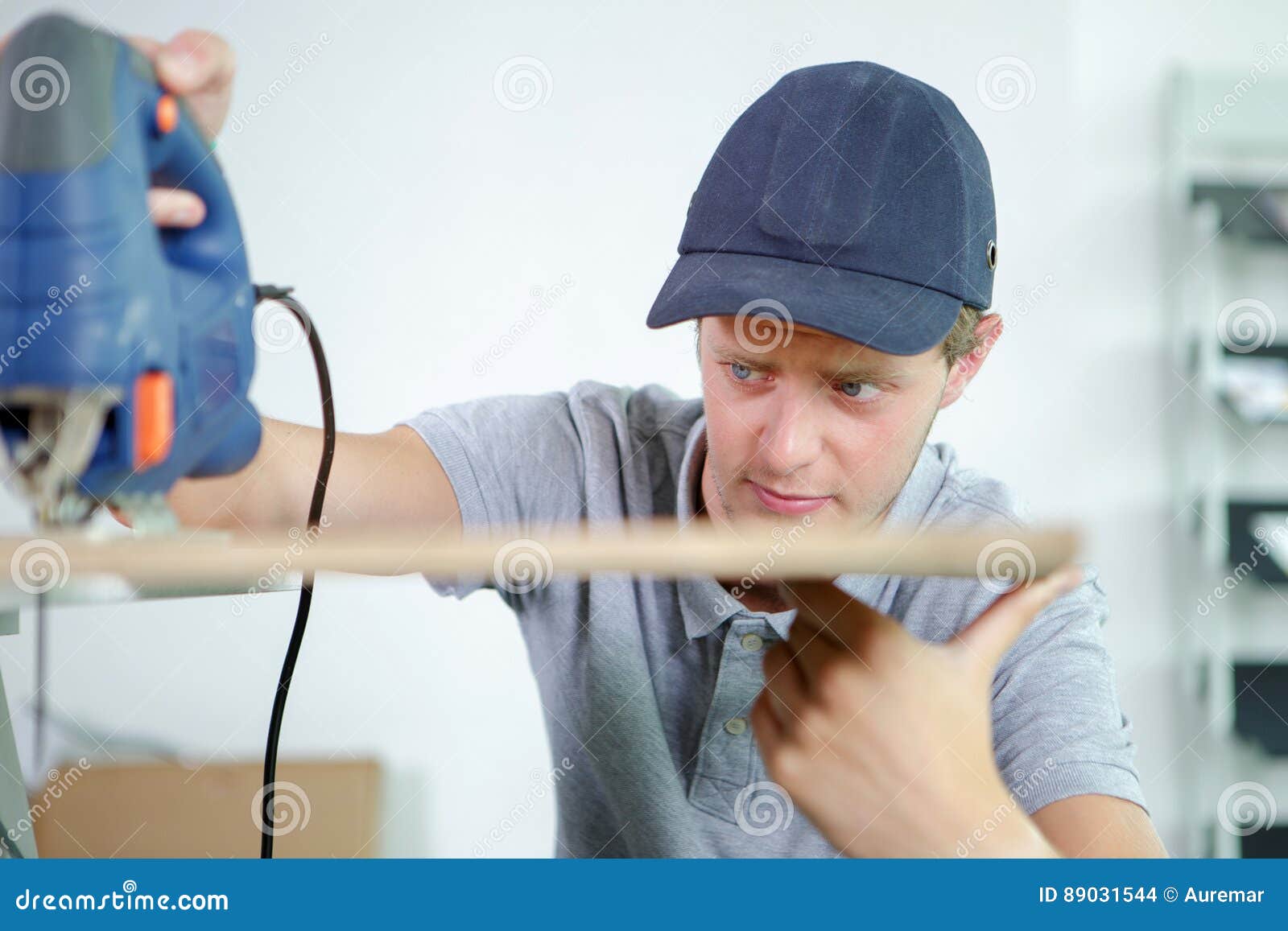 Closeup Workman Using Jigsaw Stock Photo - Image of blue, board: 89031544