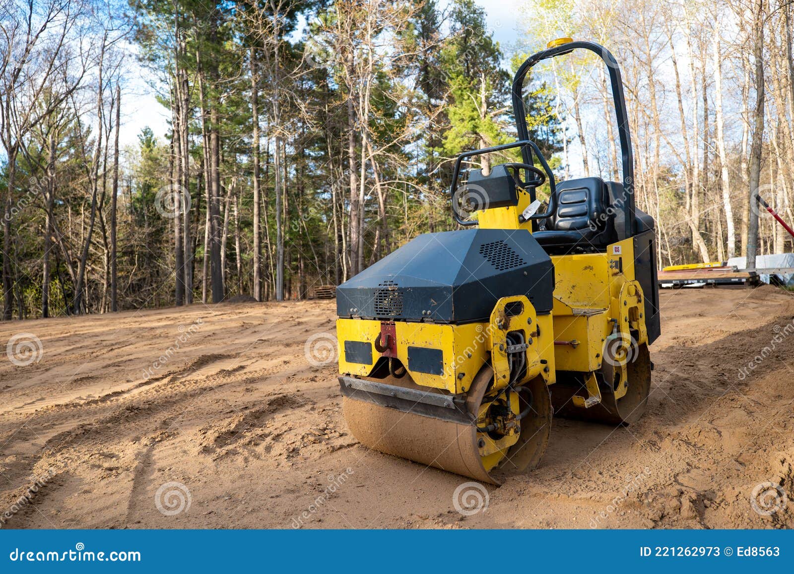 Closeup of Yellow Compactor Roller Machine on an Empty Buidling Site ...