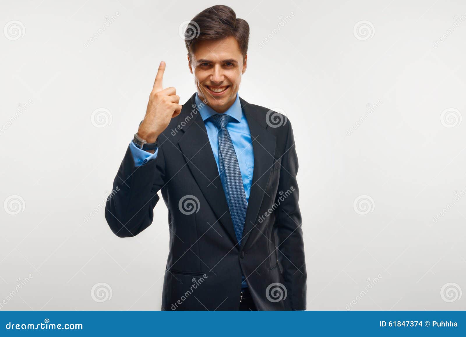 Closeup of a Young Business Man Showing Numbers. One Stock Photo ...