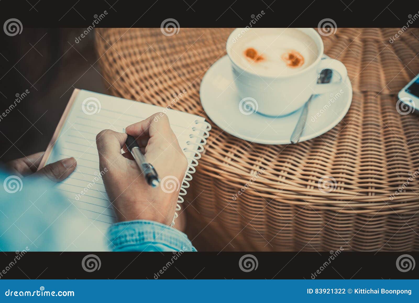 Closeup of a Young Business Woman Write a Book for Work and Drinking ...
