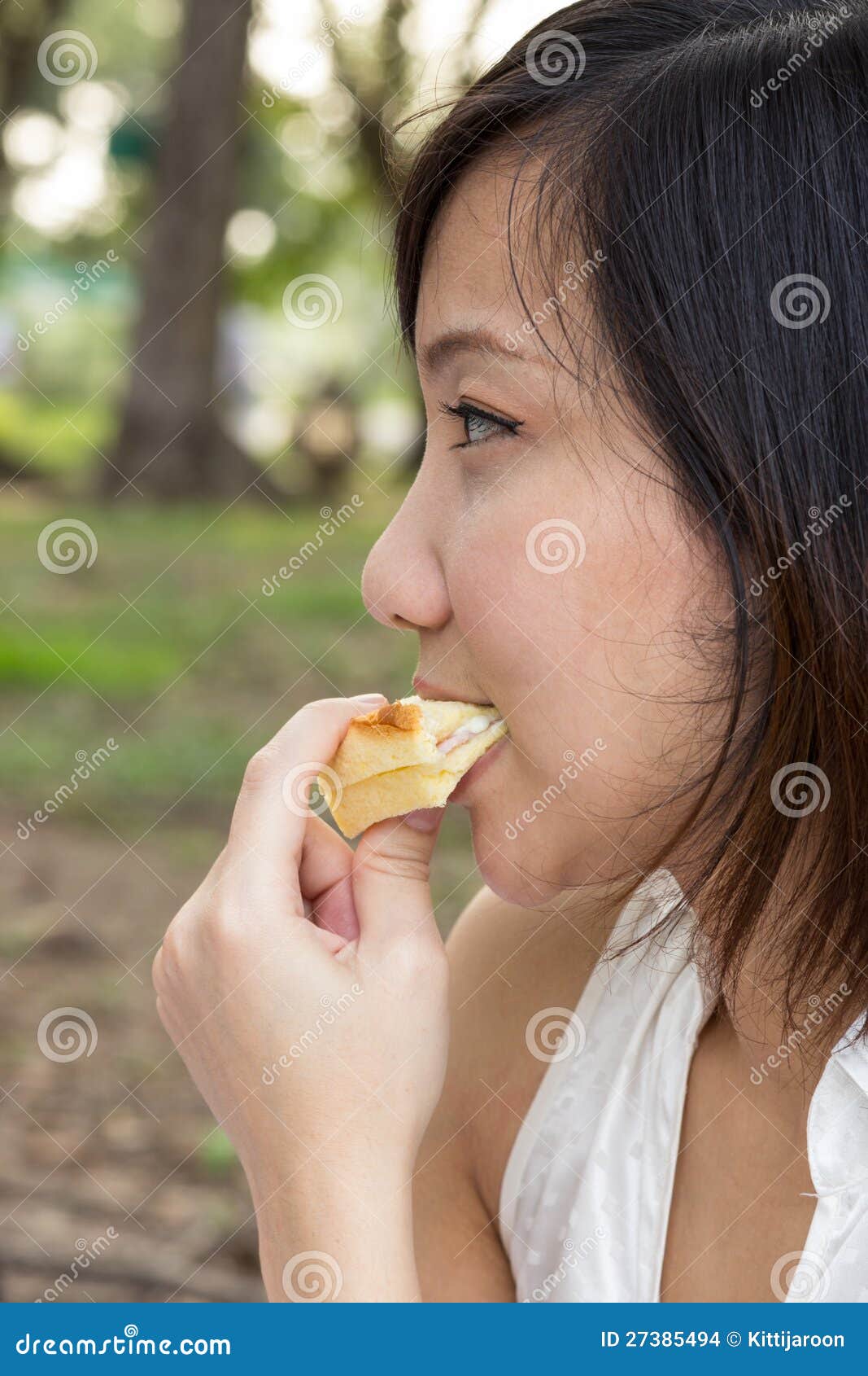 Closeup Young Girl Bite a Sandwich in Park Stock Photo - Image of ...