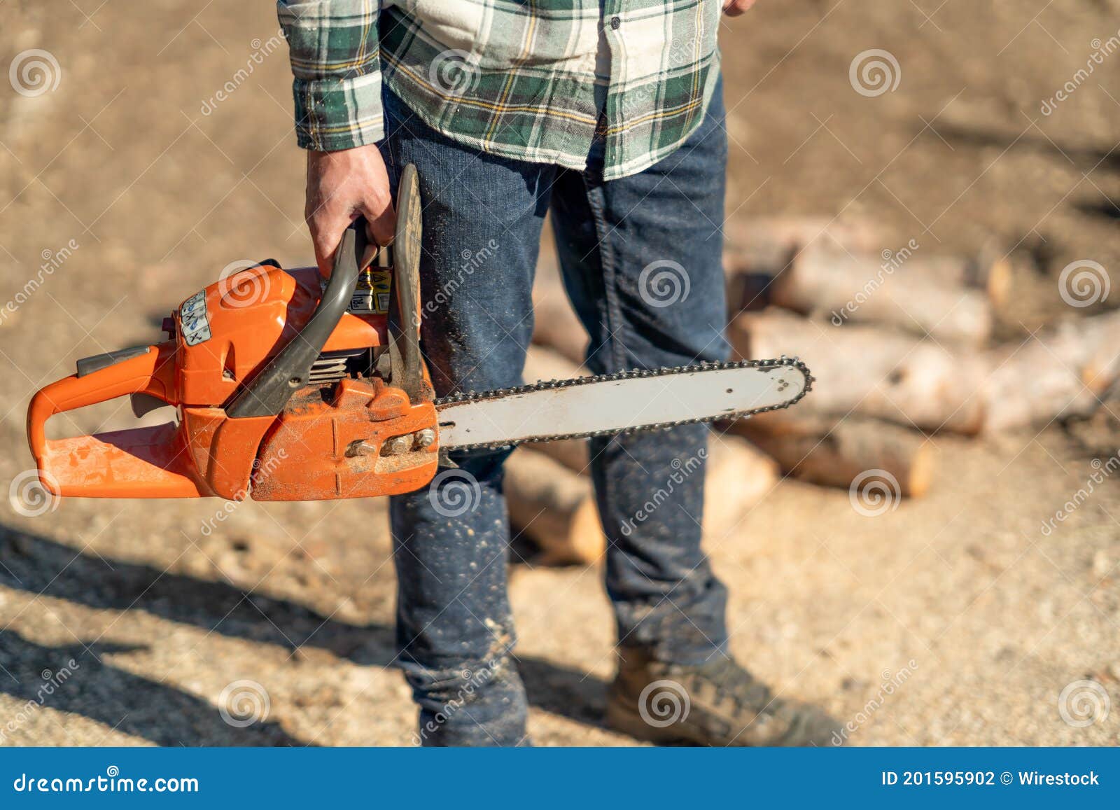 Closeup of a Young Man Holding a Chainsaw Stock Photo - Image of young ...