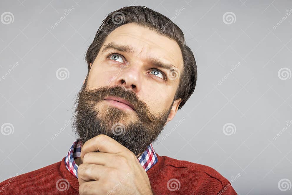 Closeup of Young Man Thinking Hard Stock Photo - Image of frowning ...