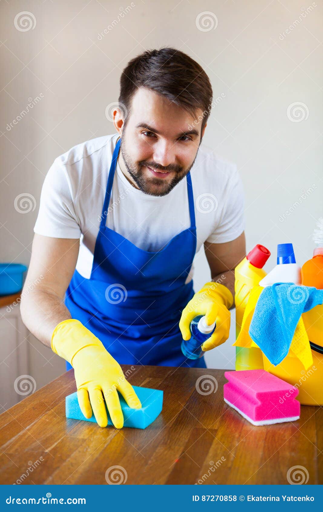 Closeup of Young Man Wearing Apron Cleaning Kitchen Worktop Stock Photo ...