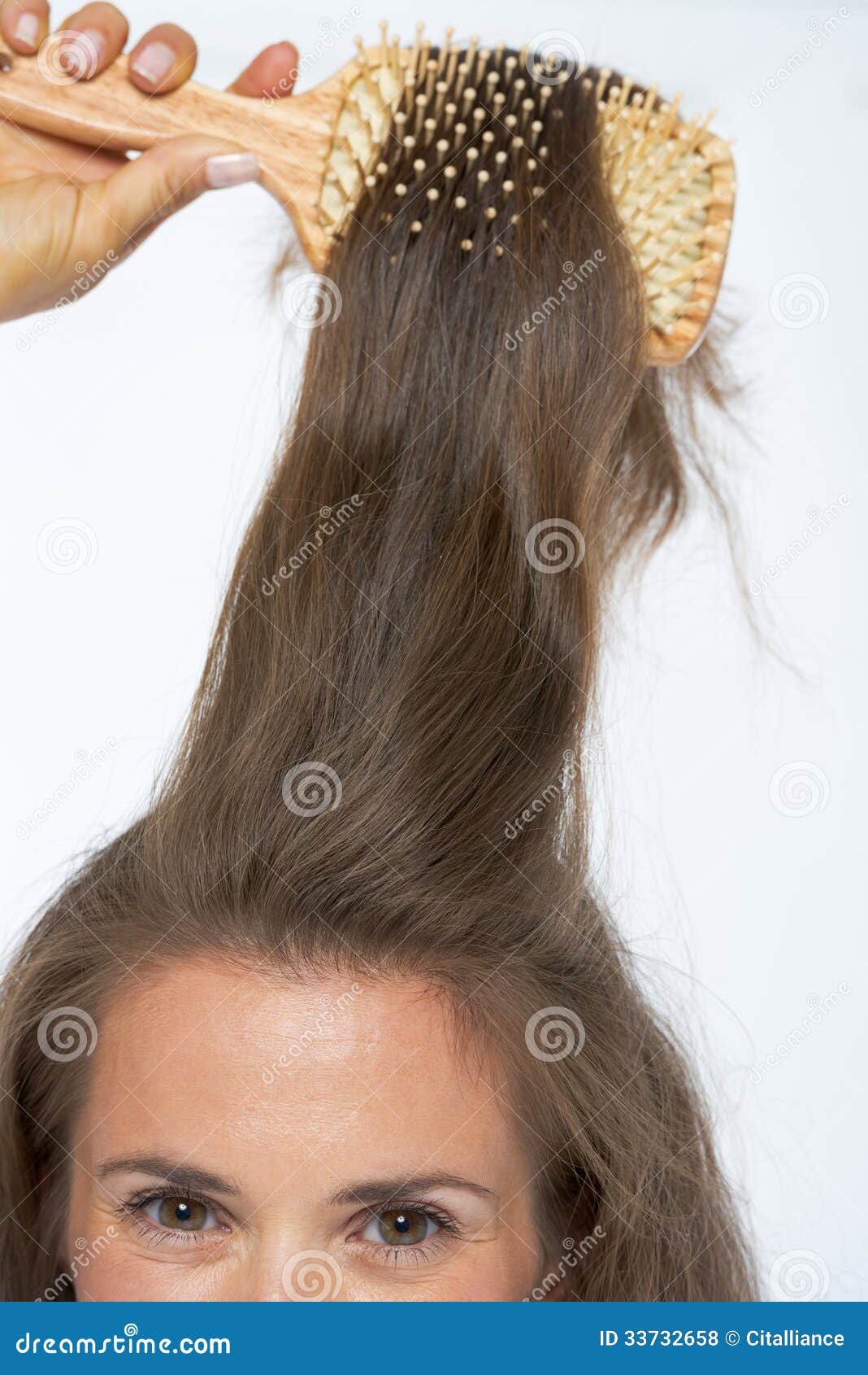 Closeup on Young Woman Combing Hair Stock Photo - Image of caucasian ...