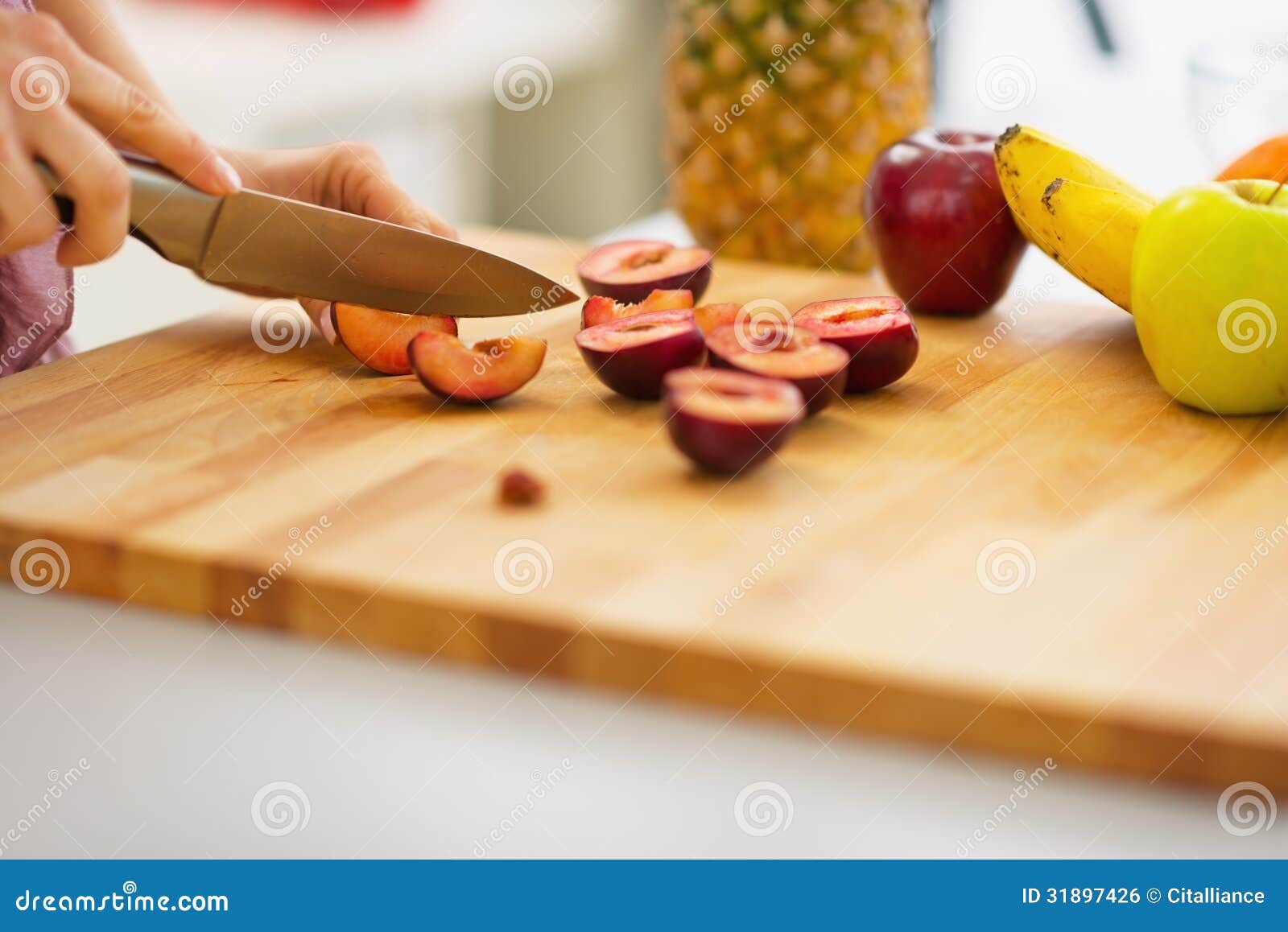 Closeup on Young Woman Cutting Plums Stock Photo - Image of slice ...