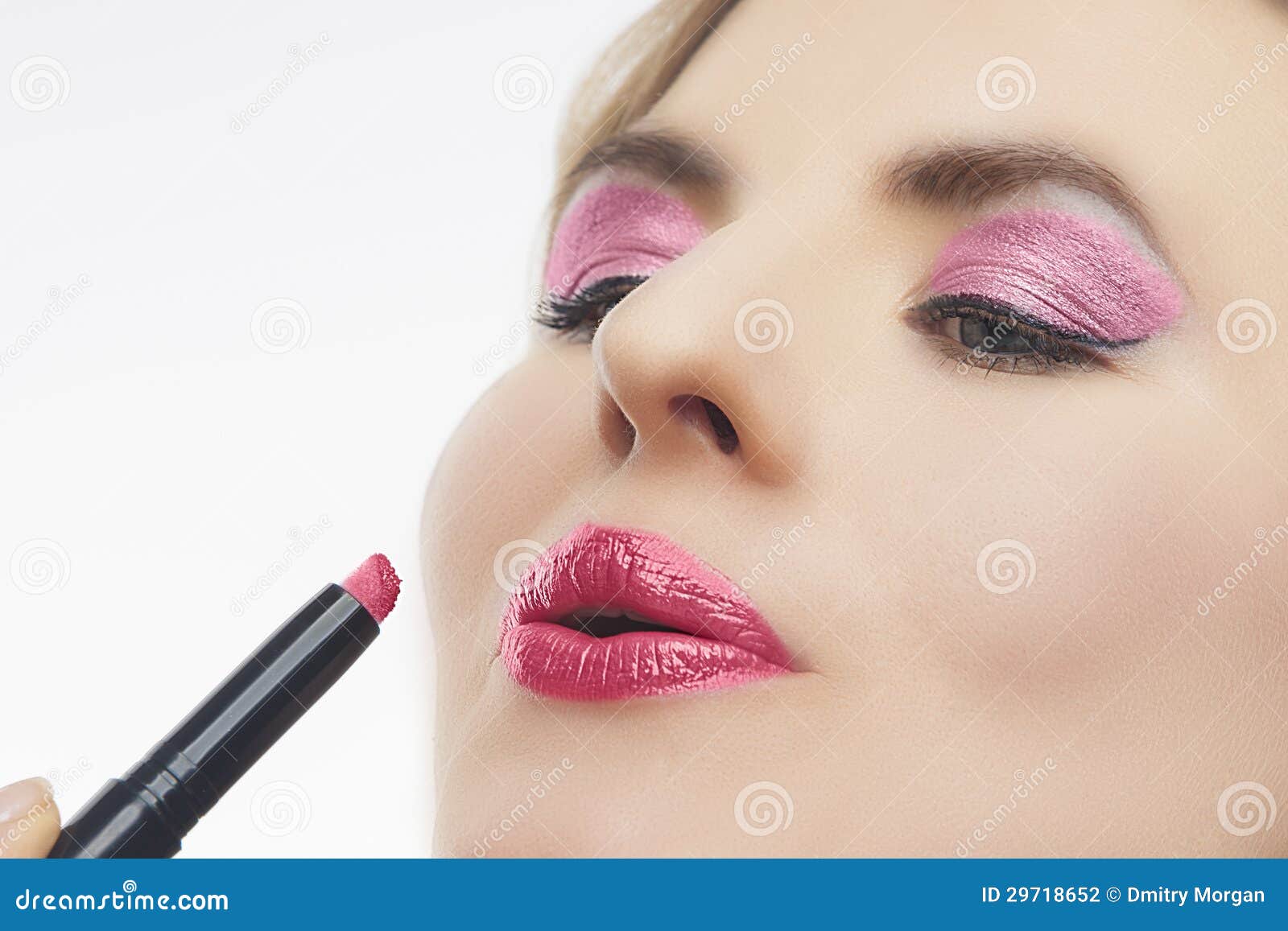 Young woman doing makeup stock photo. Image of relaxation - 29718652