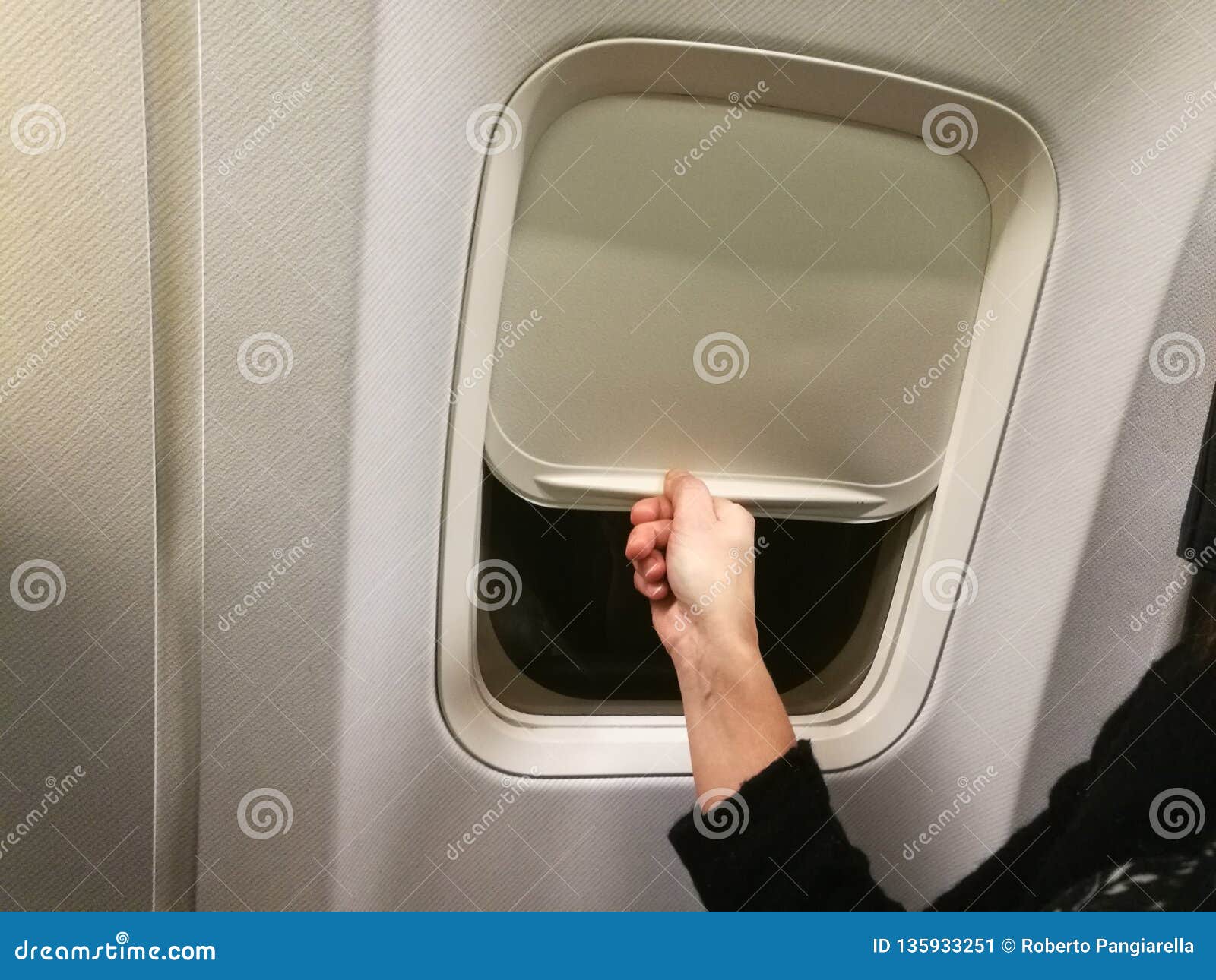 Closing of the Airplane Window Stock Image - Image of window, airplane ...
