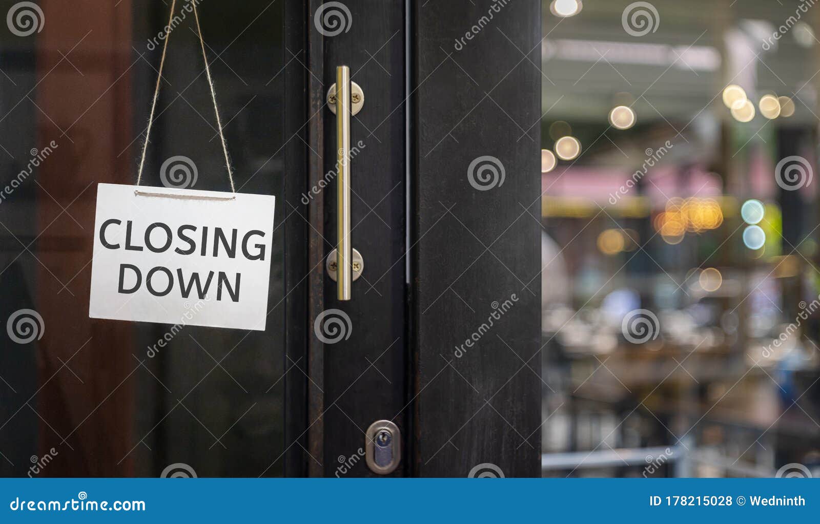 Closing Down Sign Painted on the Window of a Dress Shop Stock Photo ...