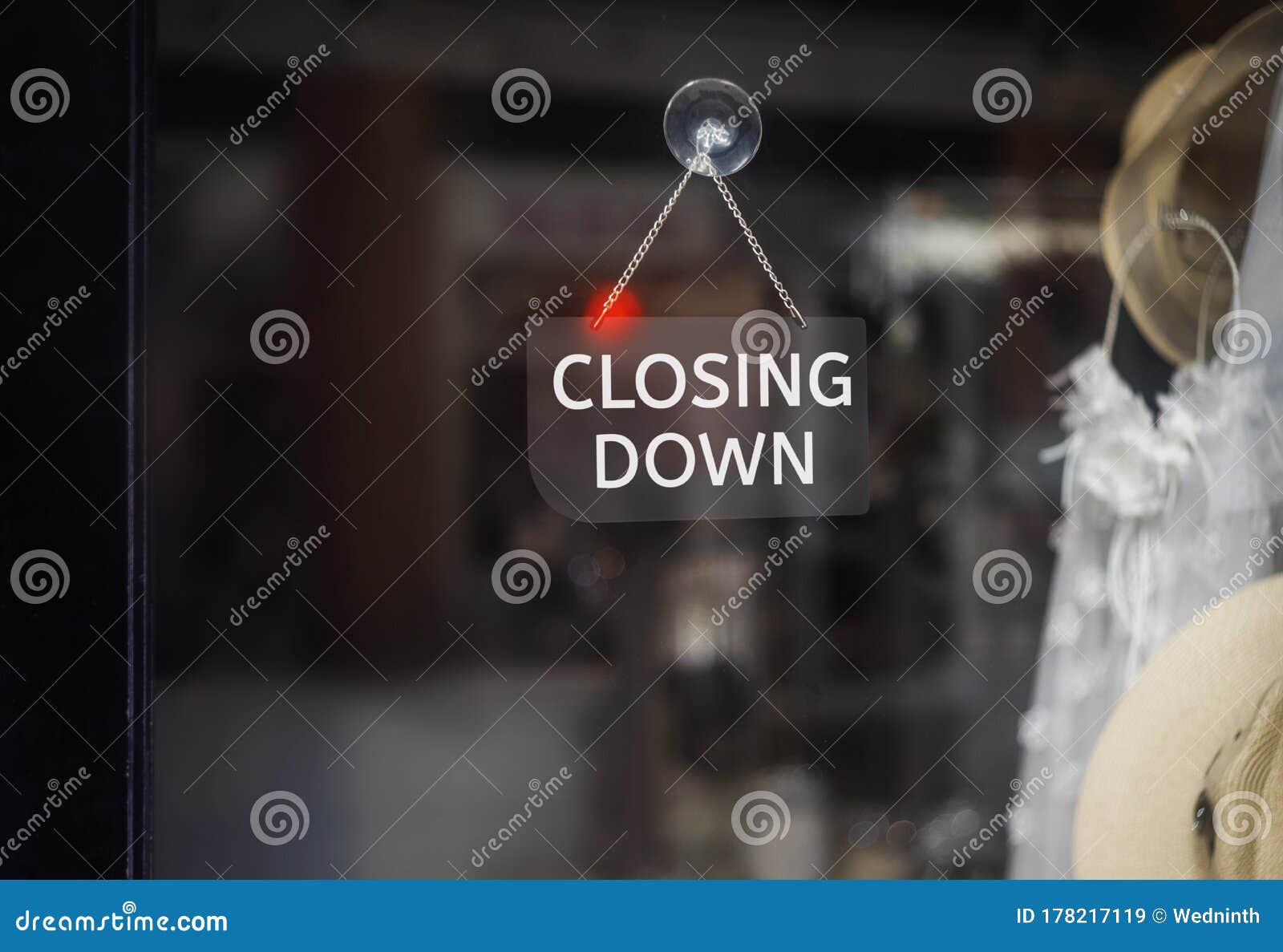 Closing Down Sign Painted on the Window of a Dress Shop Stock Image ...
