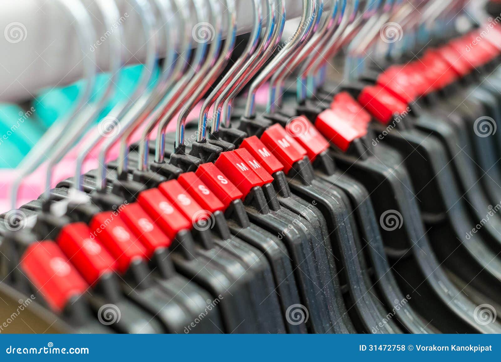 Cloth Hanger with Red Sizing Label Stock Photo - Image of size, fitting ...