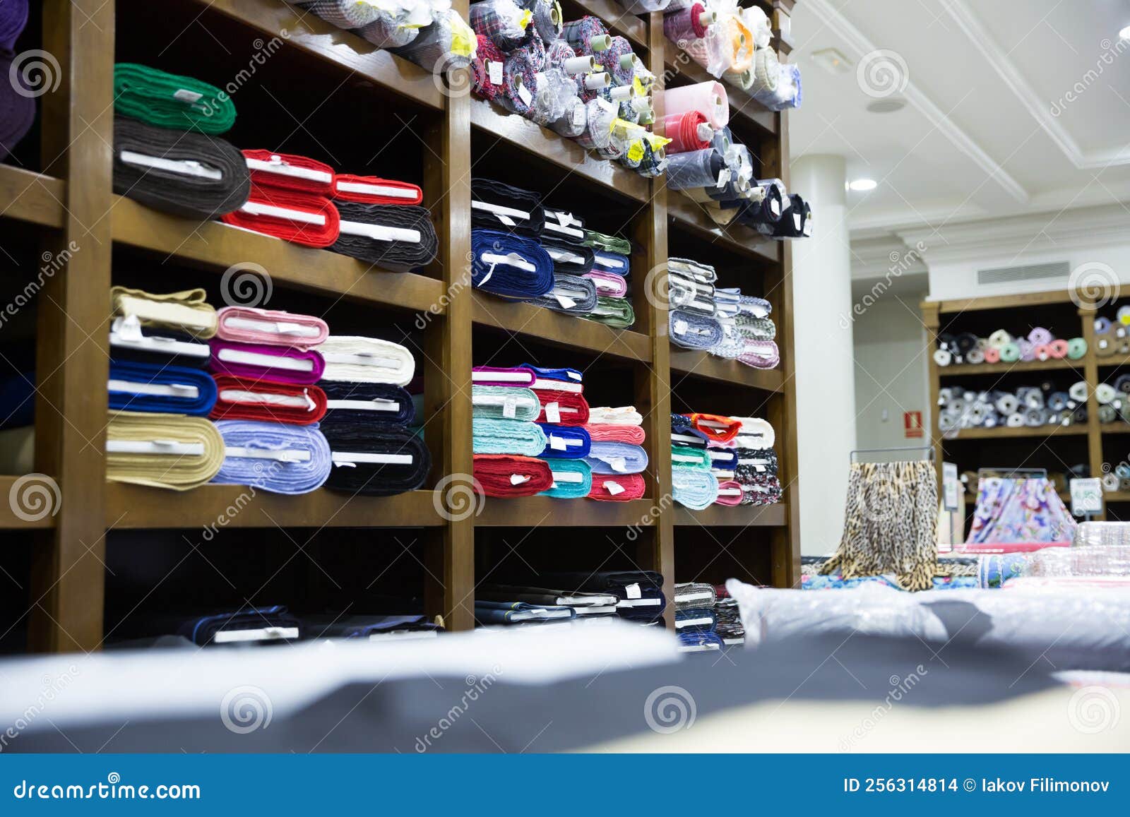 Cloth Rolls in Fabric Store Stock Photo - Image of styling, rolls ...