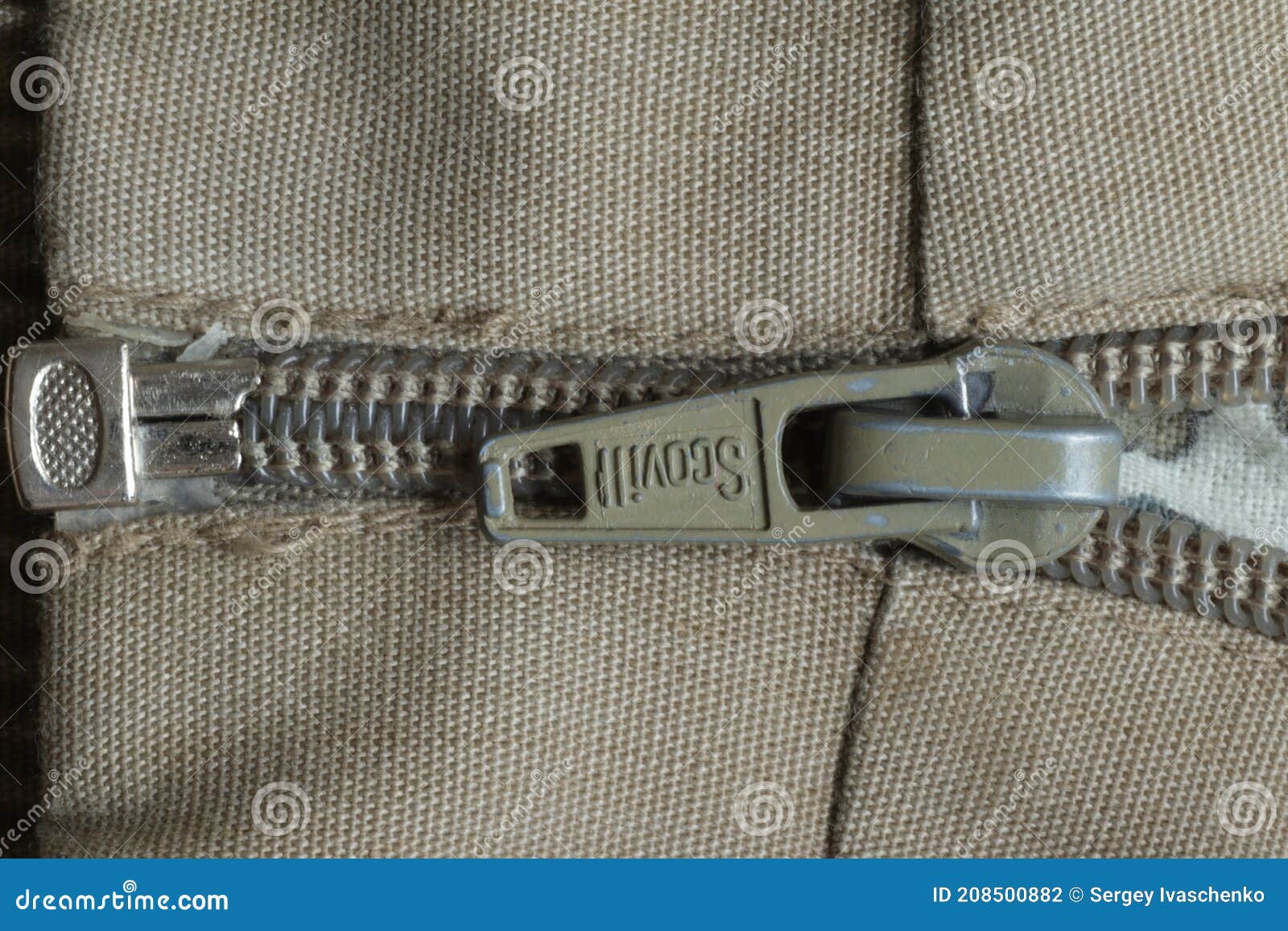 Cloth texture with clasp. stock photo. Image of garment - 208500882