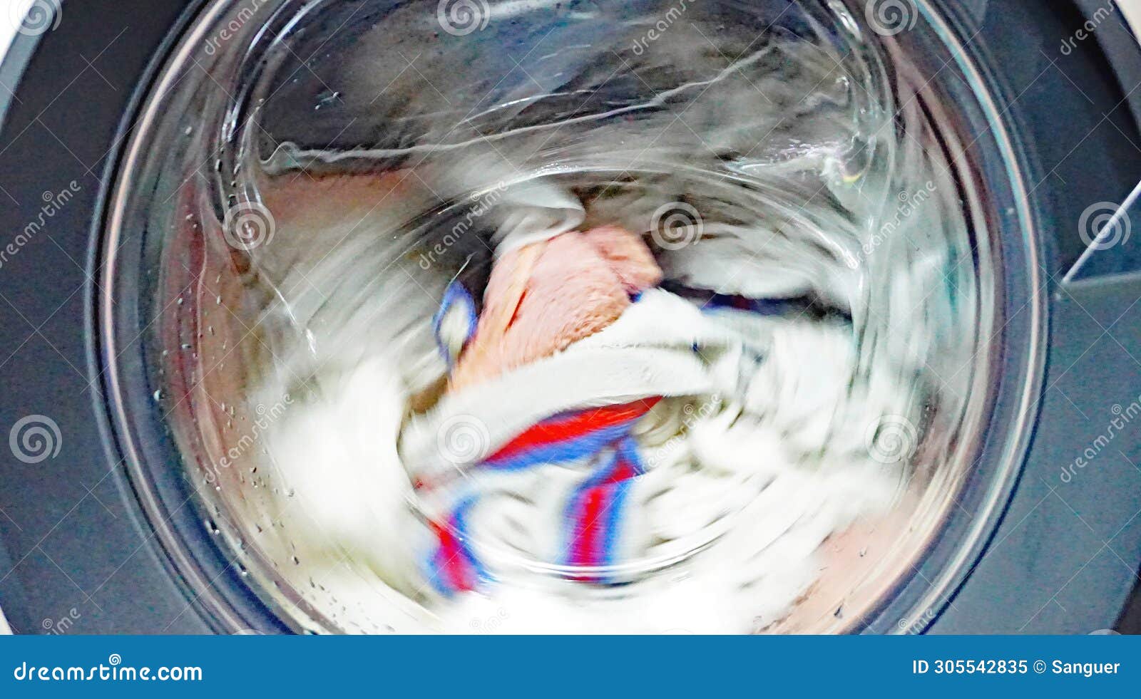 Clothes Being Washed in a Washing Machine Stock Image - Image of ...