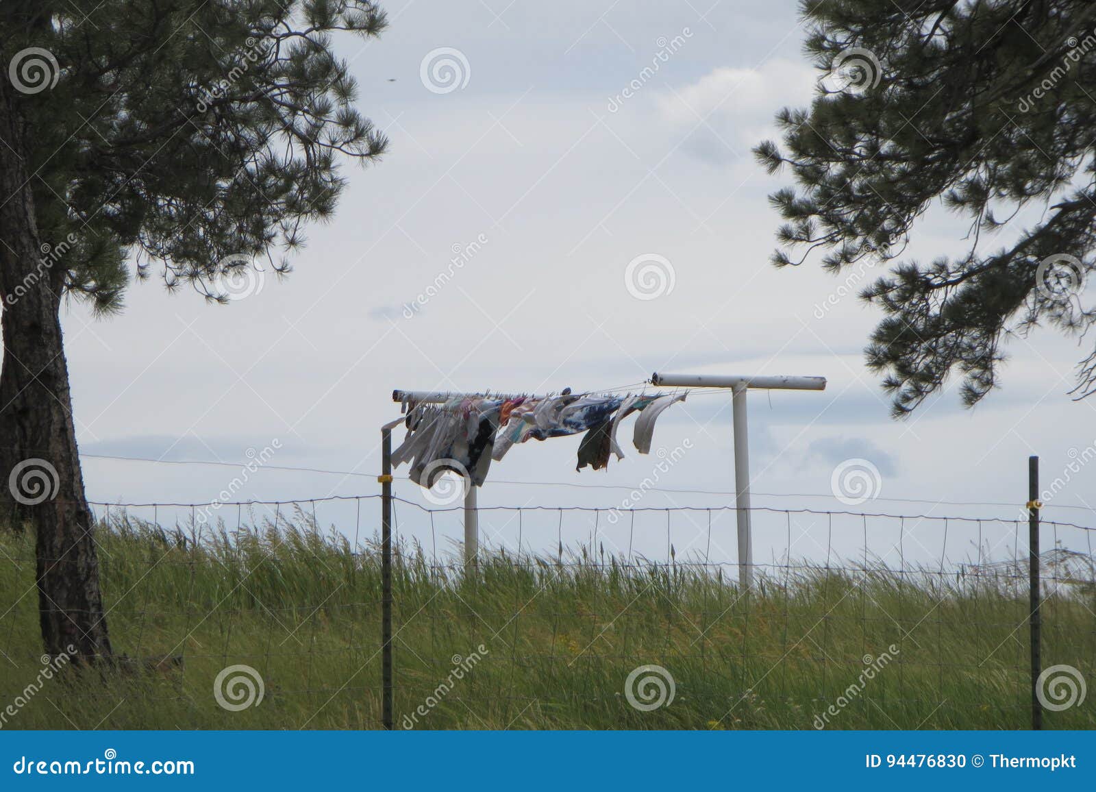 Clothes Blowing on a Clothesline Stock Photo - Image of windy, hanging ...