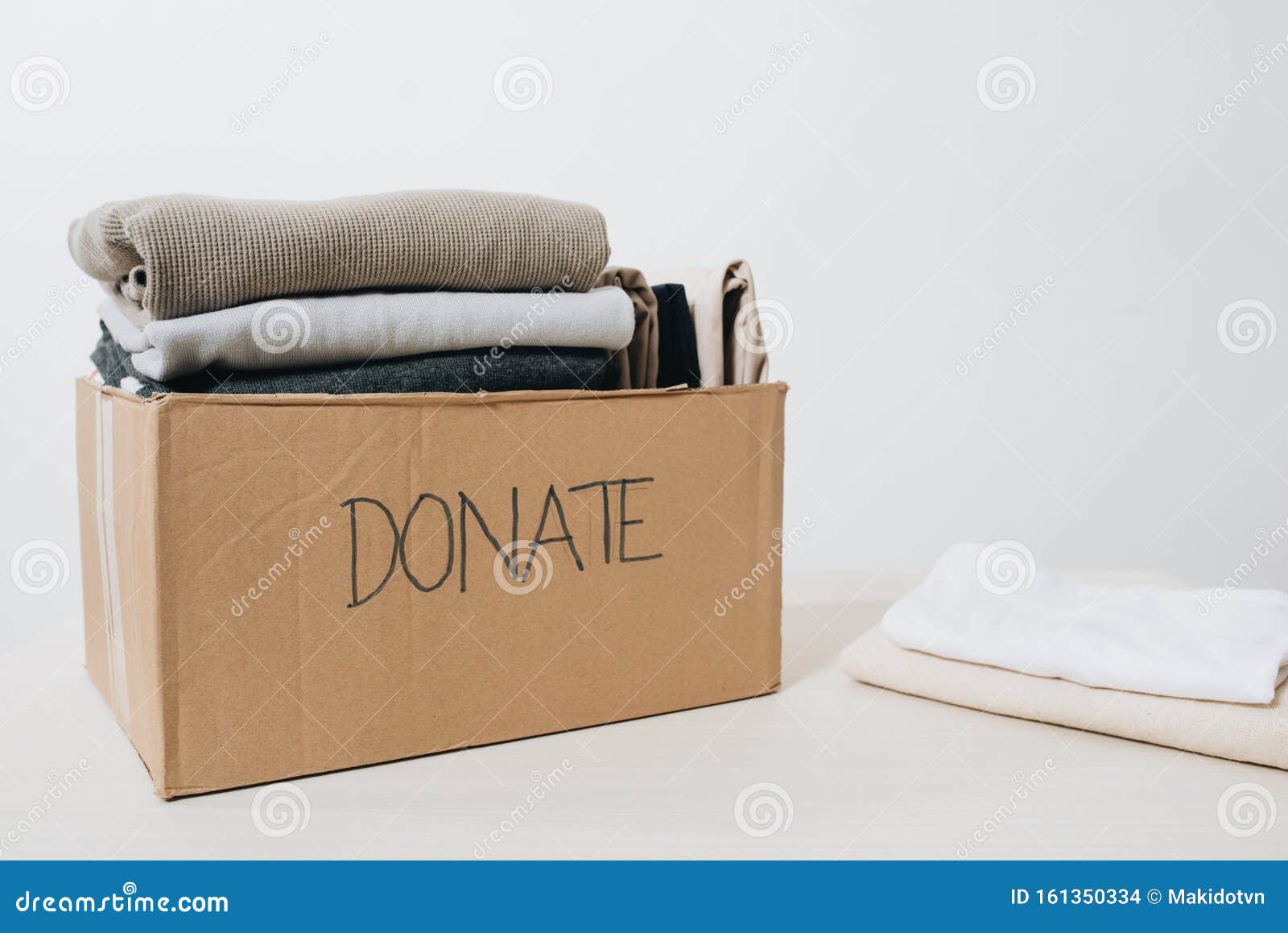 Clothes in Box for Concept Donation and Reuse Recycle Stock Photo ...