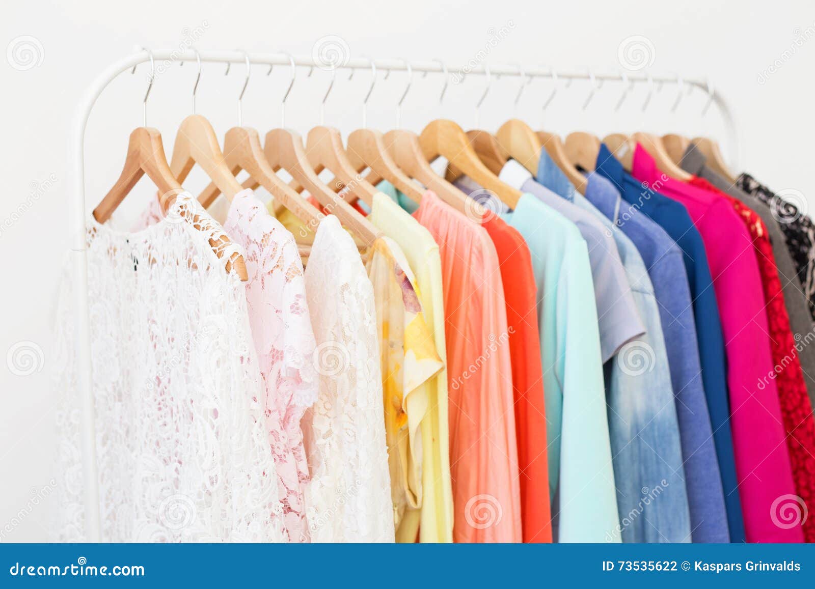 Clothes in the Closet Hanging on Hangers Stock Photo - Image of ...
