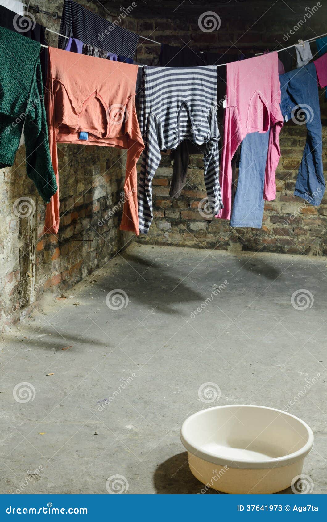 Clothes on clothesline stock image. Image of bowl, indside - 37641973