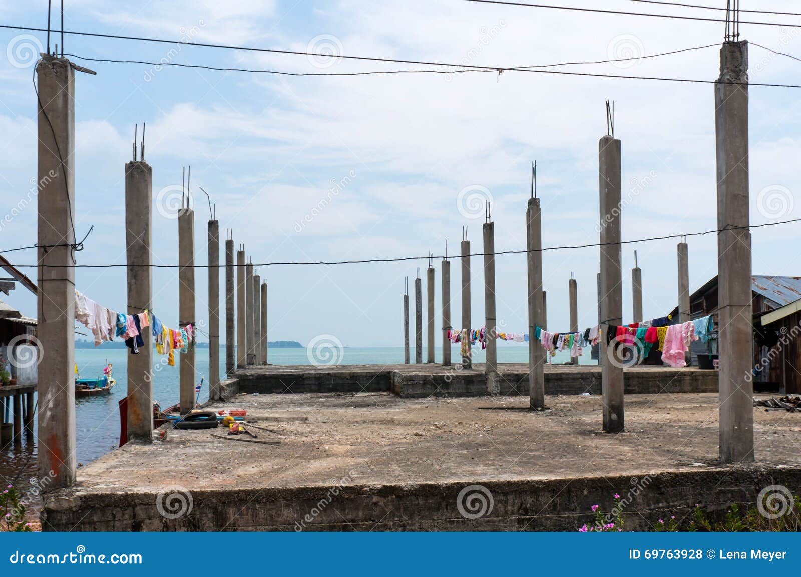 Clothes Drying on Concrete Construction Stock Photo - Image of drying ...