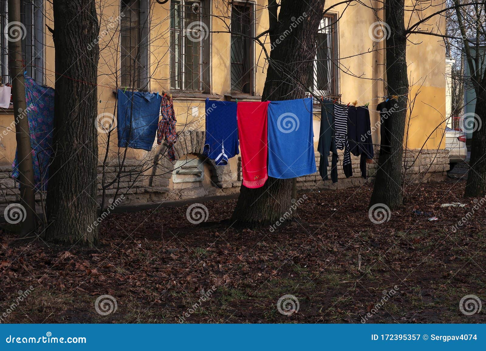 Clothes drying on a rope stock image. Image of construction - 172395357