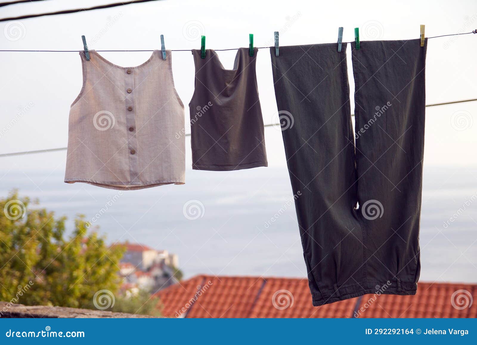 Clothes drying on the wind stock photo. Image of clothes - 292292164