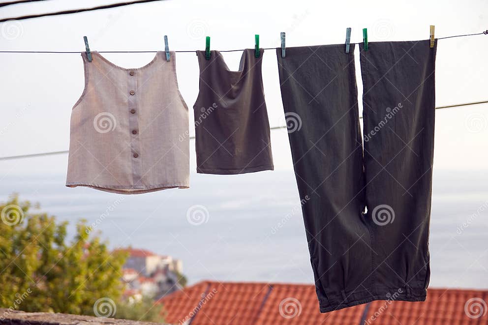 Clothes drying on the wind stock photo. Image of clothes - 292292164