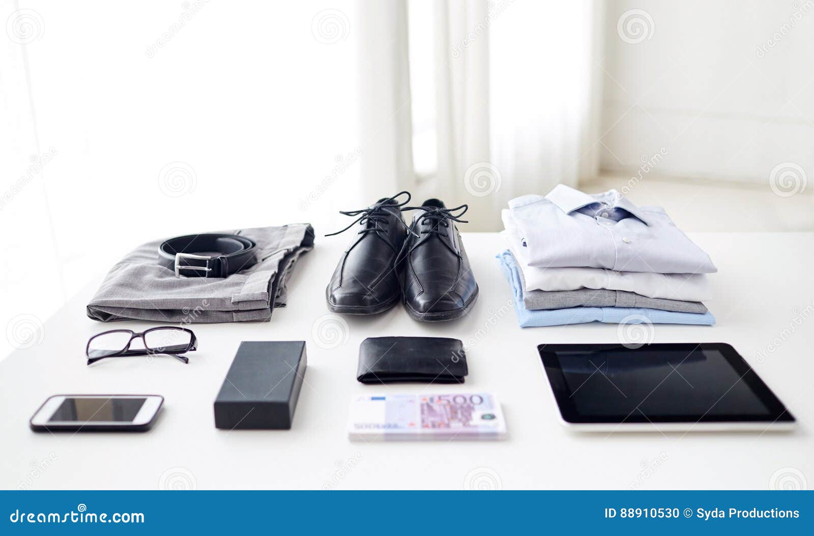 Clothes, Gadgets and Business Stuff on Table Stock Photo - Image of ...