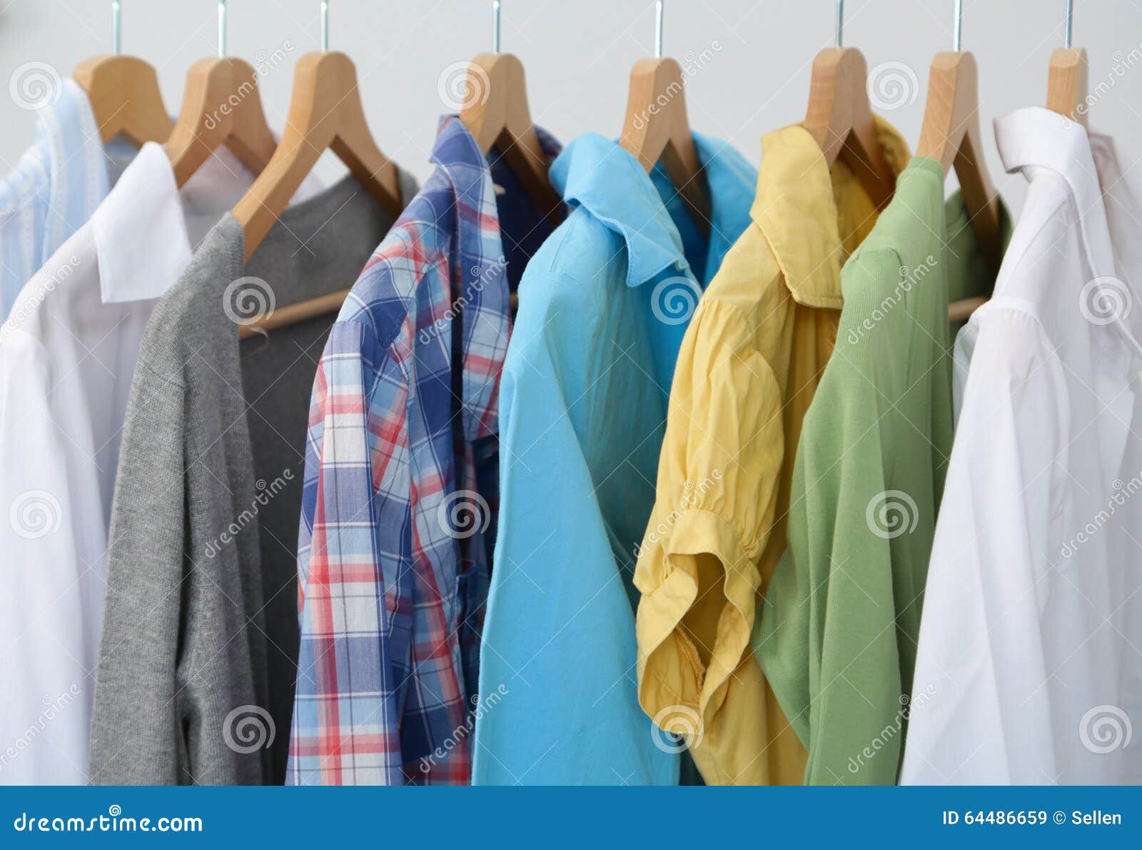 Clothes Hang on a Shelf in Designer Clothes Store Stock Image - Image ...