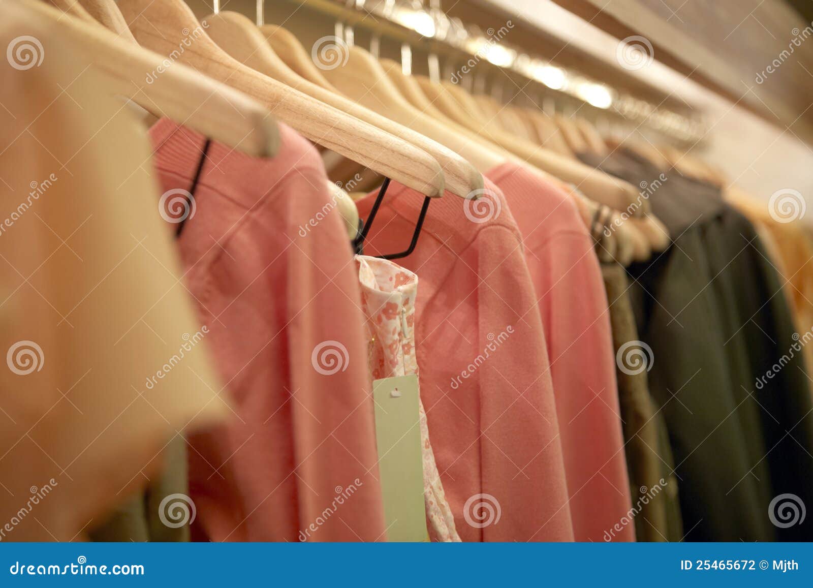 Clothes on Hangers stock photo. Image of closeup, price - 25465672