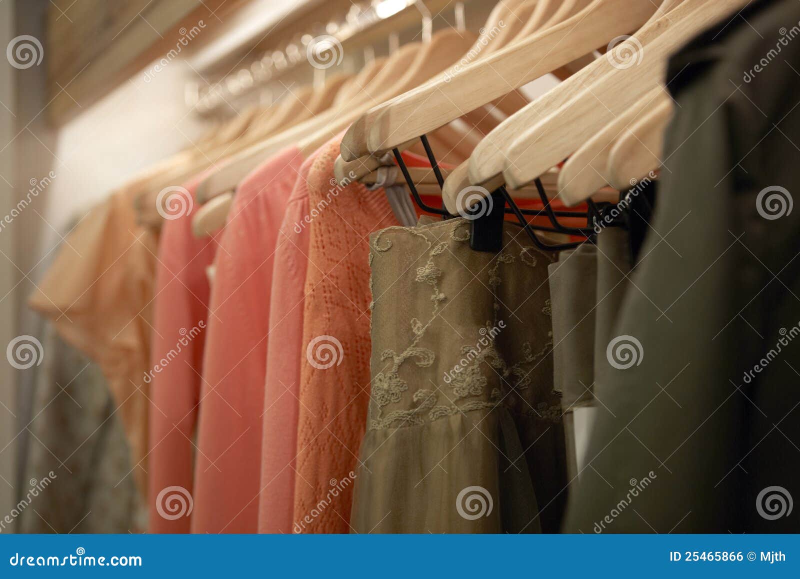 Clothes on Hangers stock photo. Image of line, expensive - 25465866