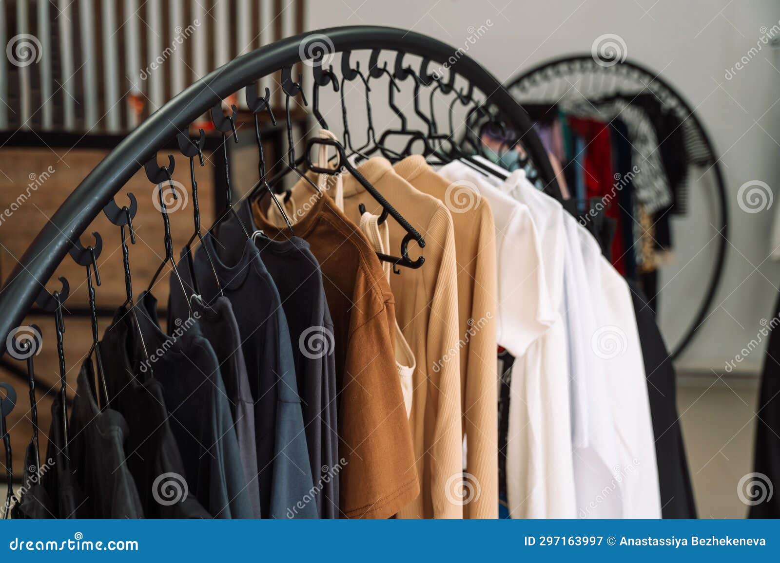 Clothes on Hangers Hang on the Rack in a Clothing Store Stock Image ...