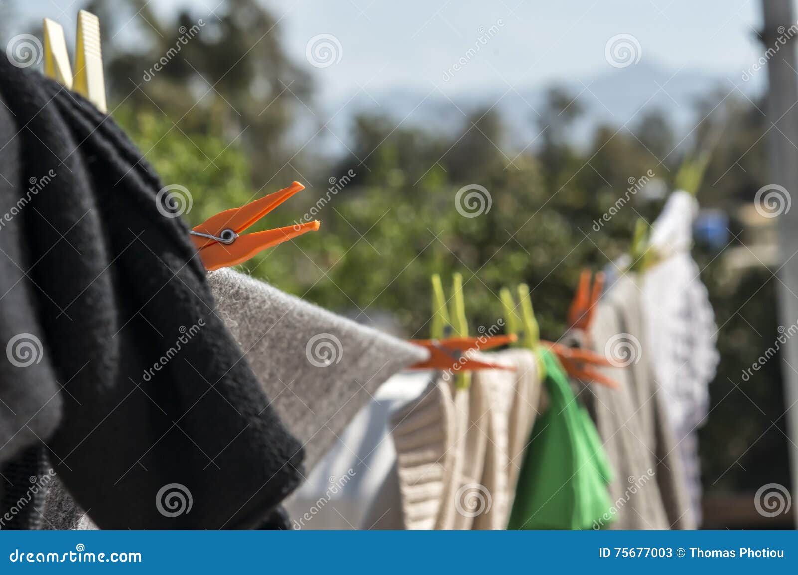 Clothes Hanging on a Clothesline Stock Image - Image of outdoors, clean ...