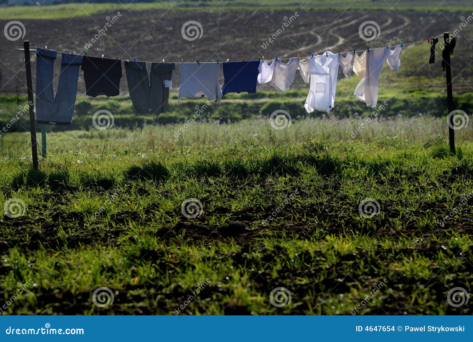 Clothes hanging on a line stock photo. Image of brown - 4647654