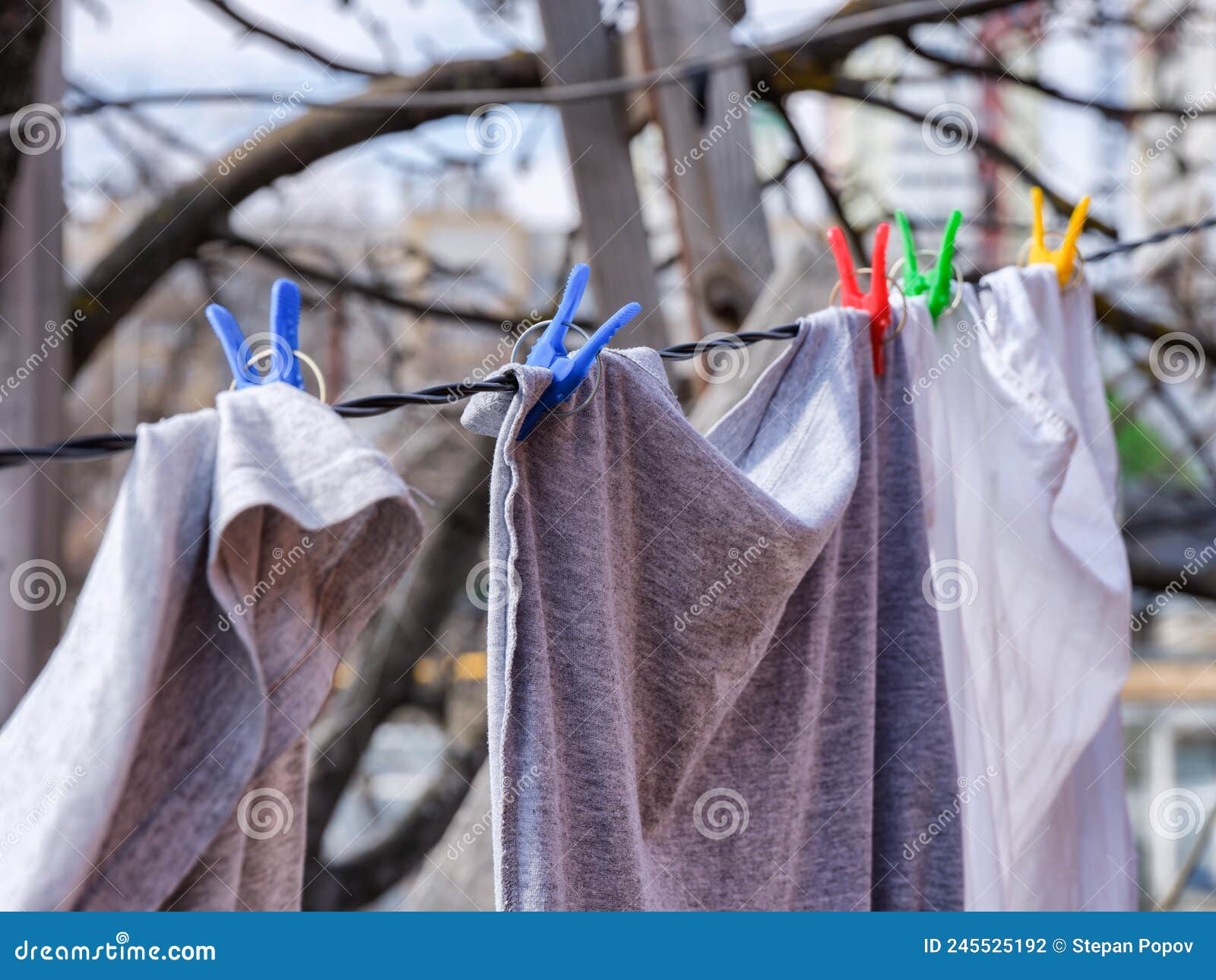 Clothes Hanging on a Clothes Line Stock Photo - Image of housework ...