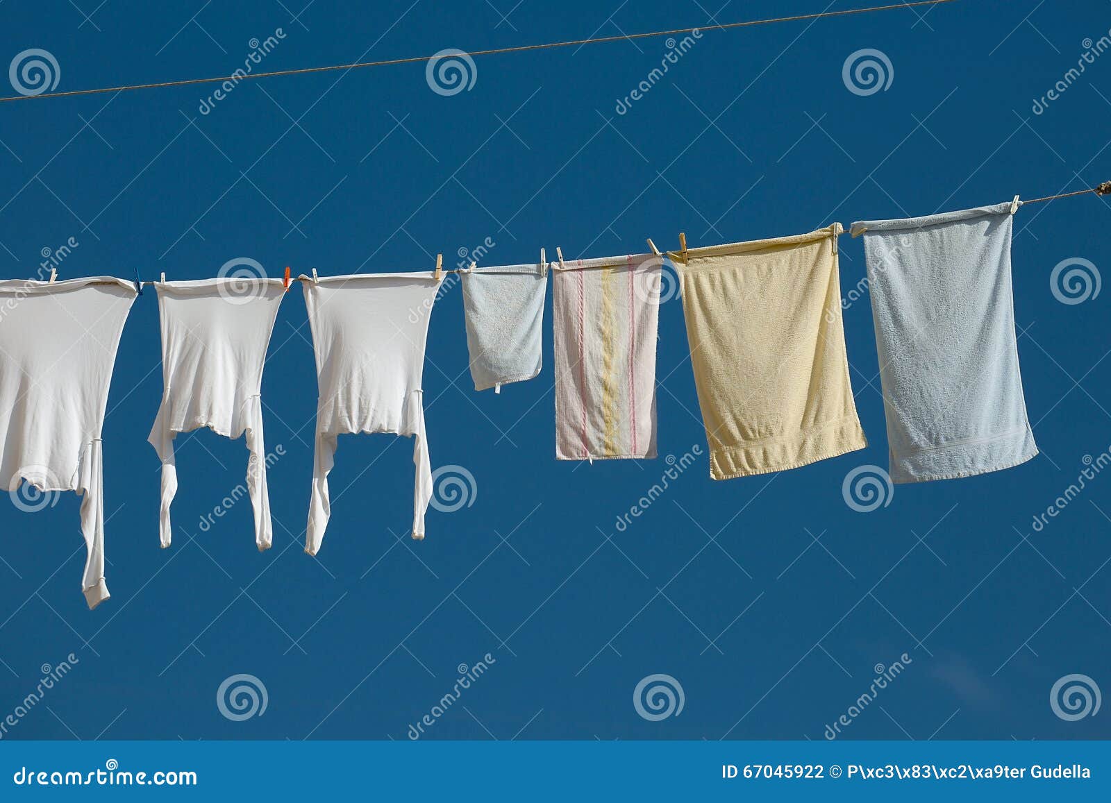 Clothes Hanging Outside stock photo. Image of clothes - 67045922