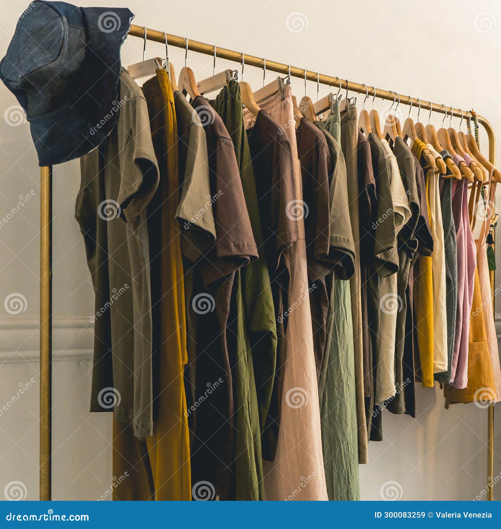 Clothes Hanging on a Rack in a Showroom Stock Image - Image of fabric ...