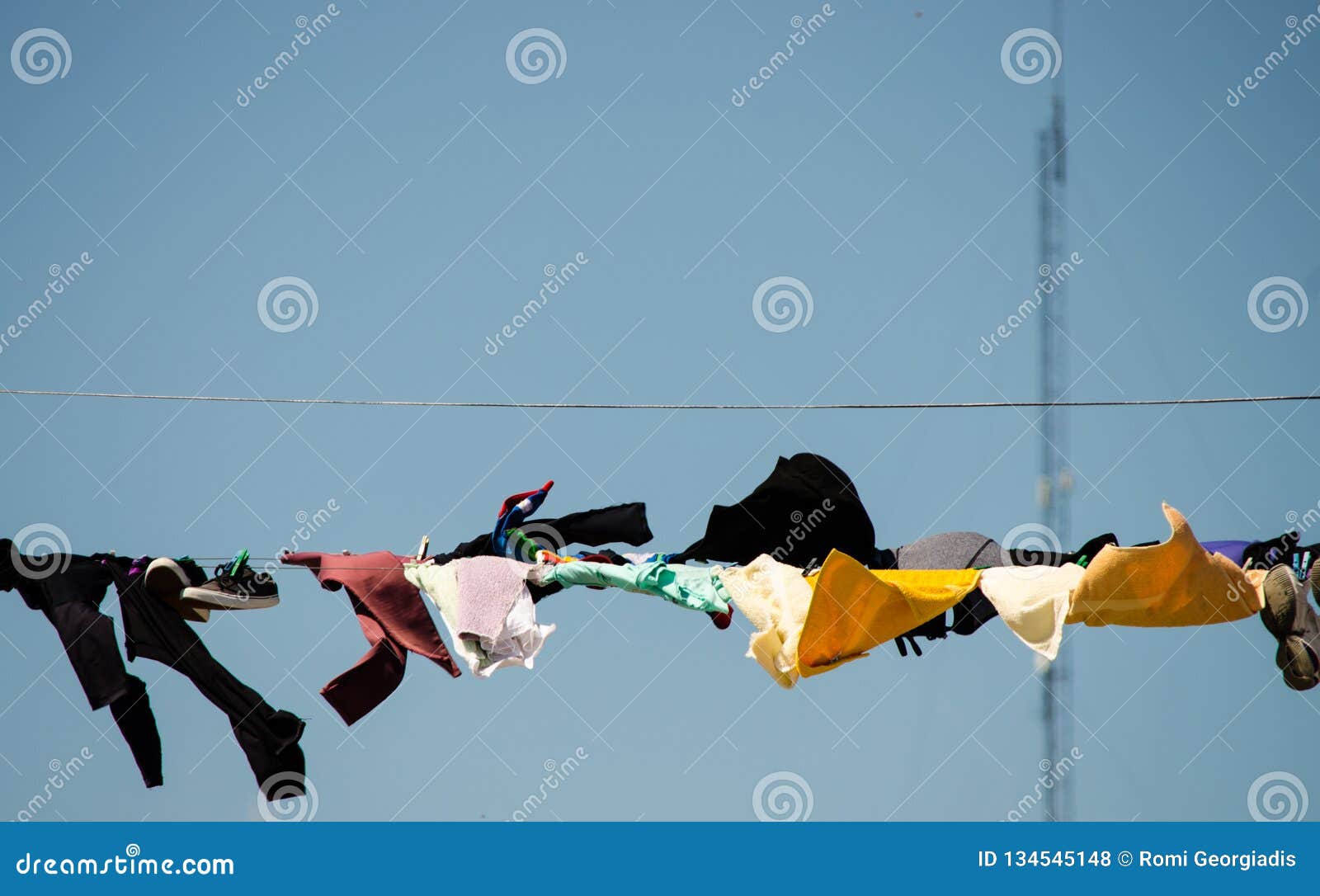 Clothes Hanging on a Windy Day Stock Photo - Image of yellow, close ...