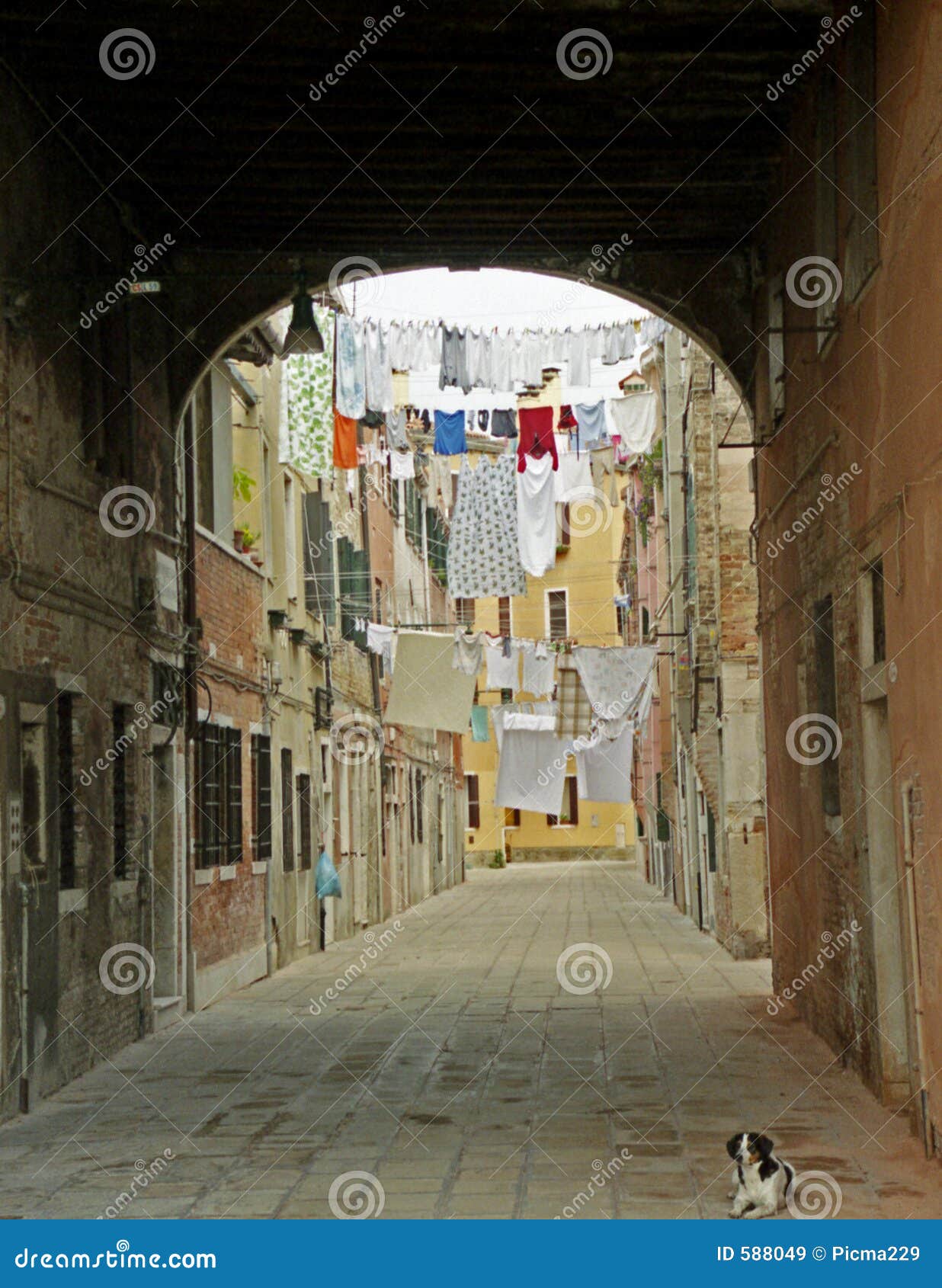 Clothes-lines Over the Road Stock Image - Image of court, house: 588049