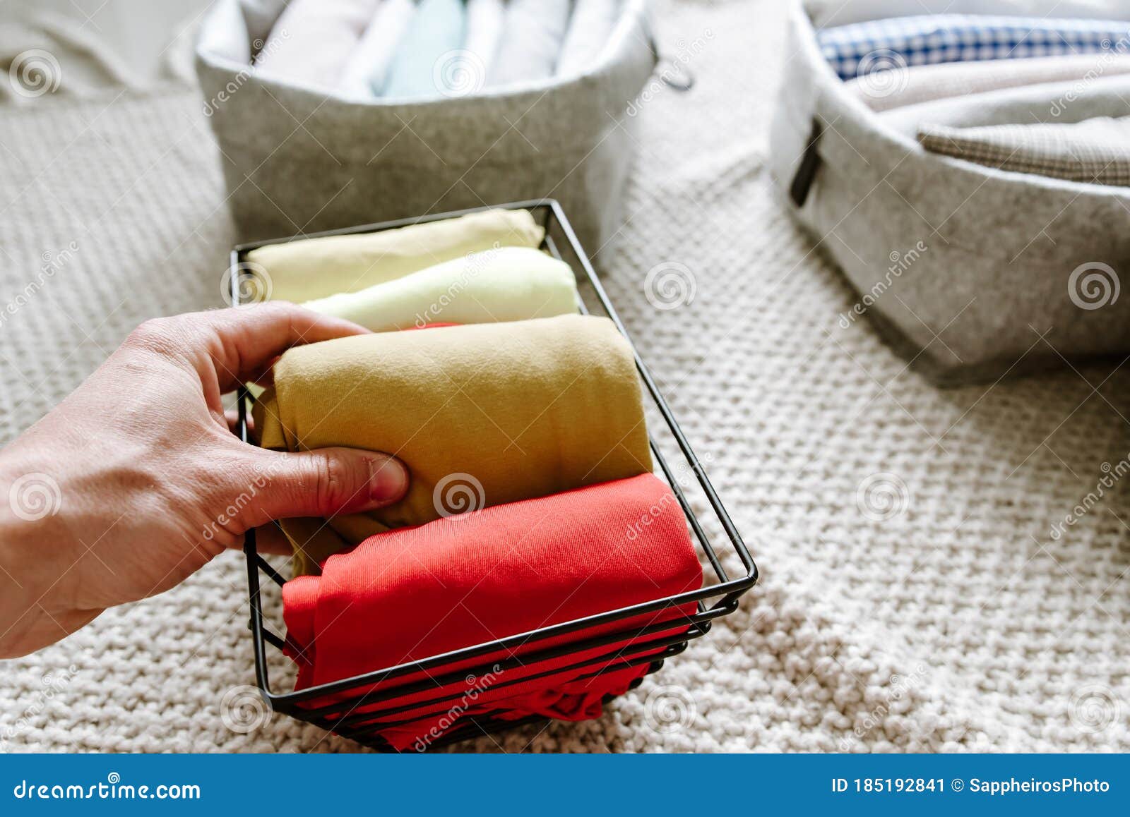 Clothes Neatly Folded, Laundry Organized and Rolled in Boxes Stock ...
