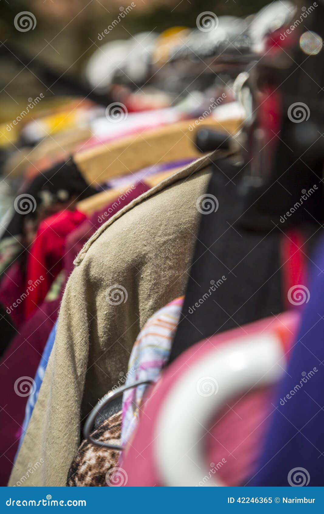 Clothes on a Rack on a Flea Market Stock Image - Image of clothing ...