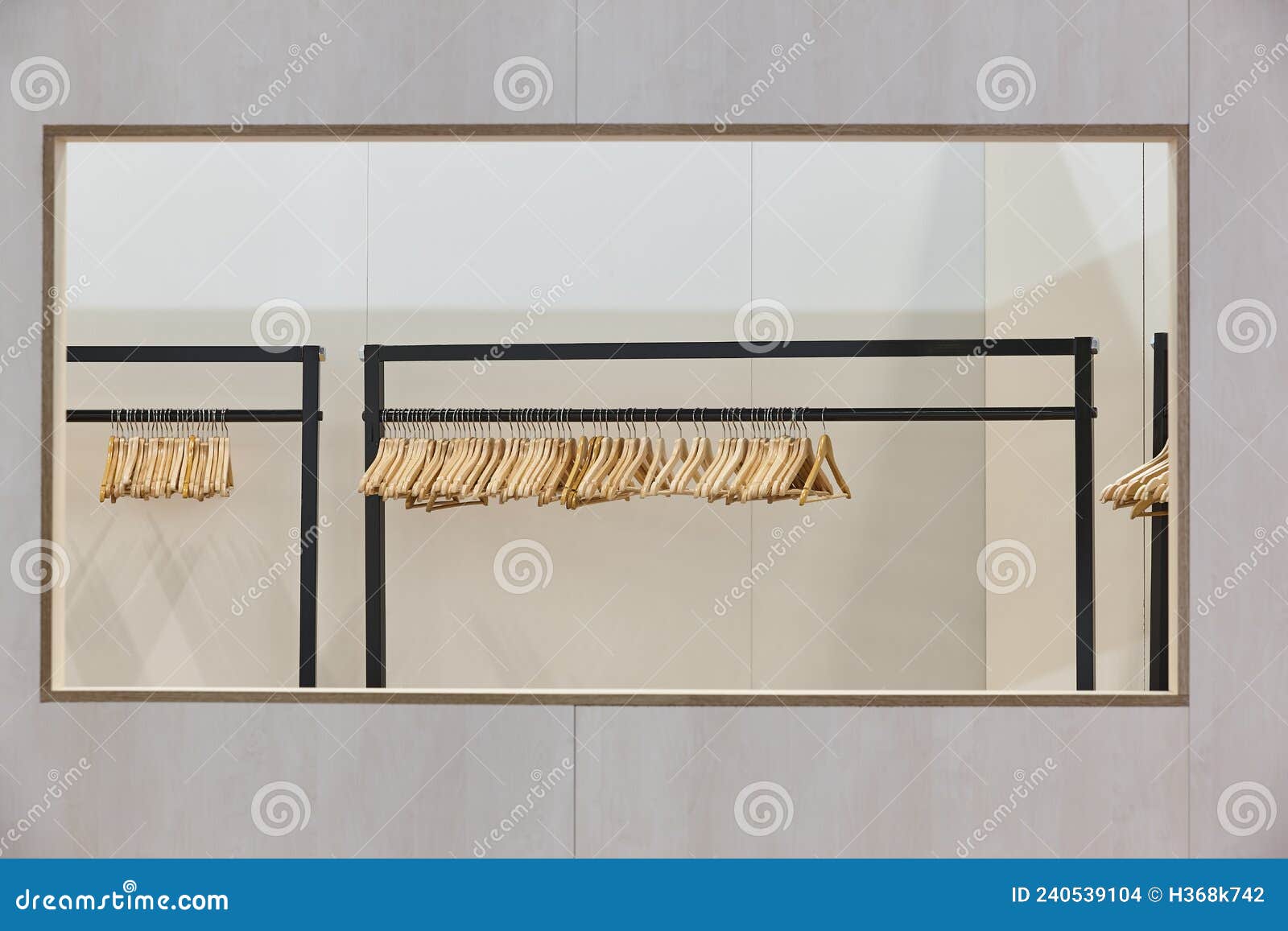 Clothes Rack with Hangers on a Dressing Room. Showroom Set Stock Photo ...