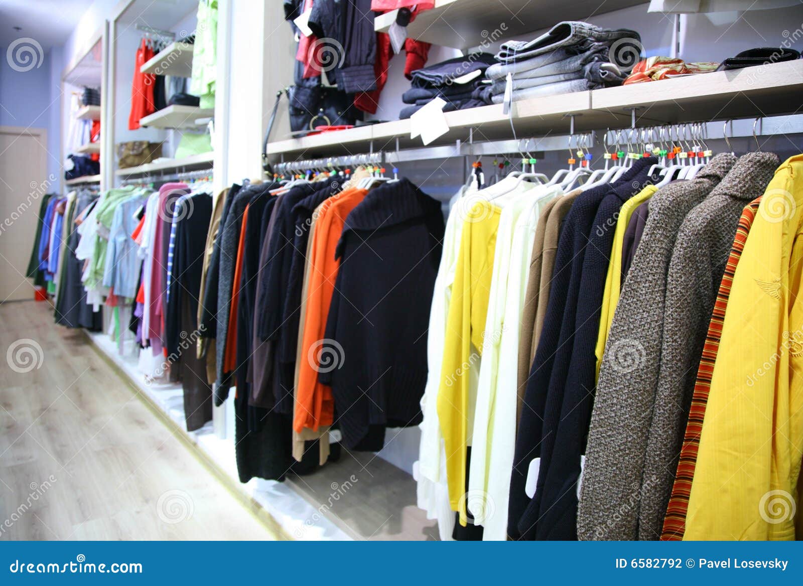 Clothes on rack in shop stock photo. Image of culture - 6582792