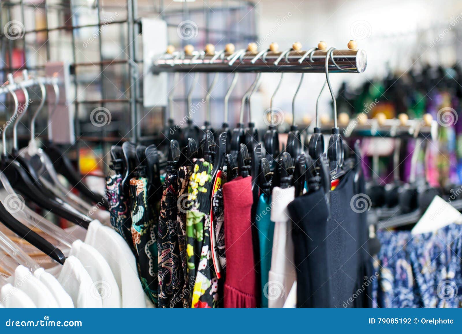 Clothes on Rail in Clothing Store Stock Photo - Image of fabric, sale ...