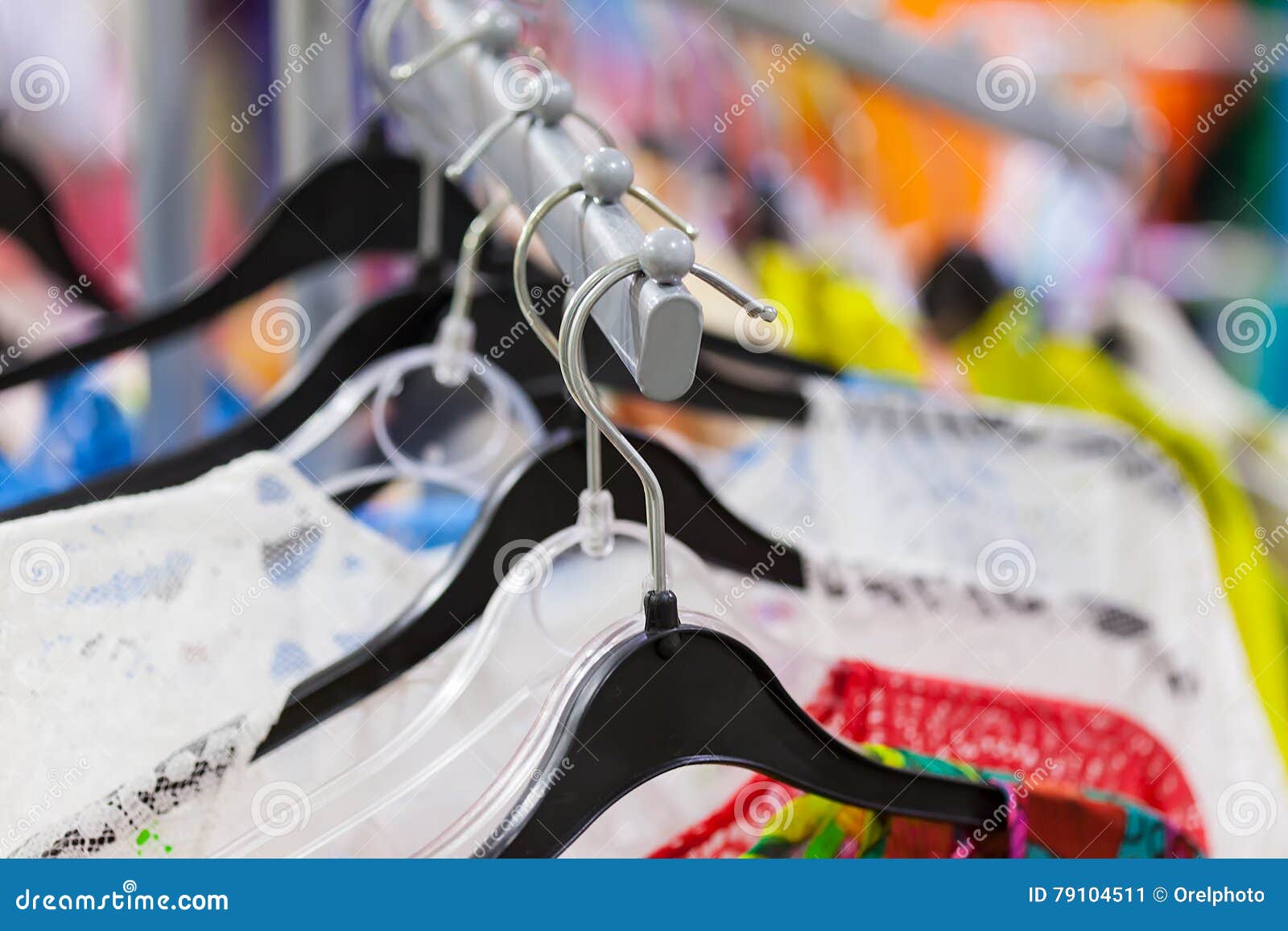 Clothes on Rail in Clothing Store Stock Image - Image of color, garment ...