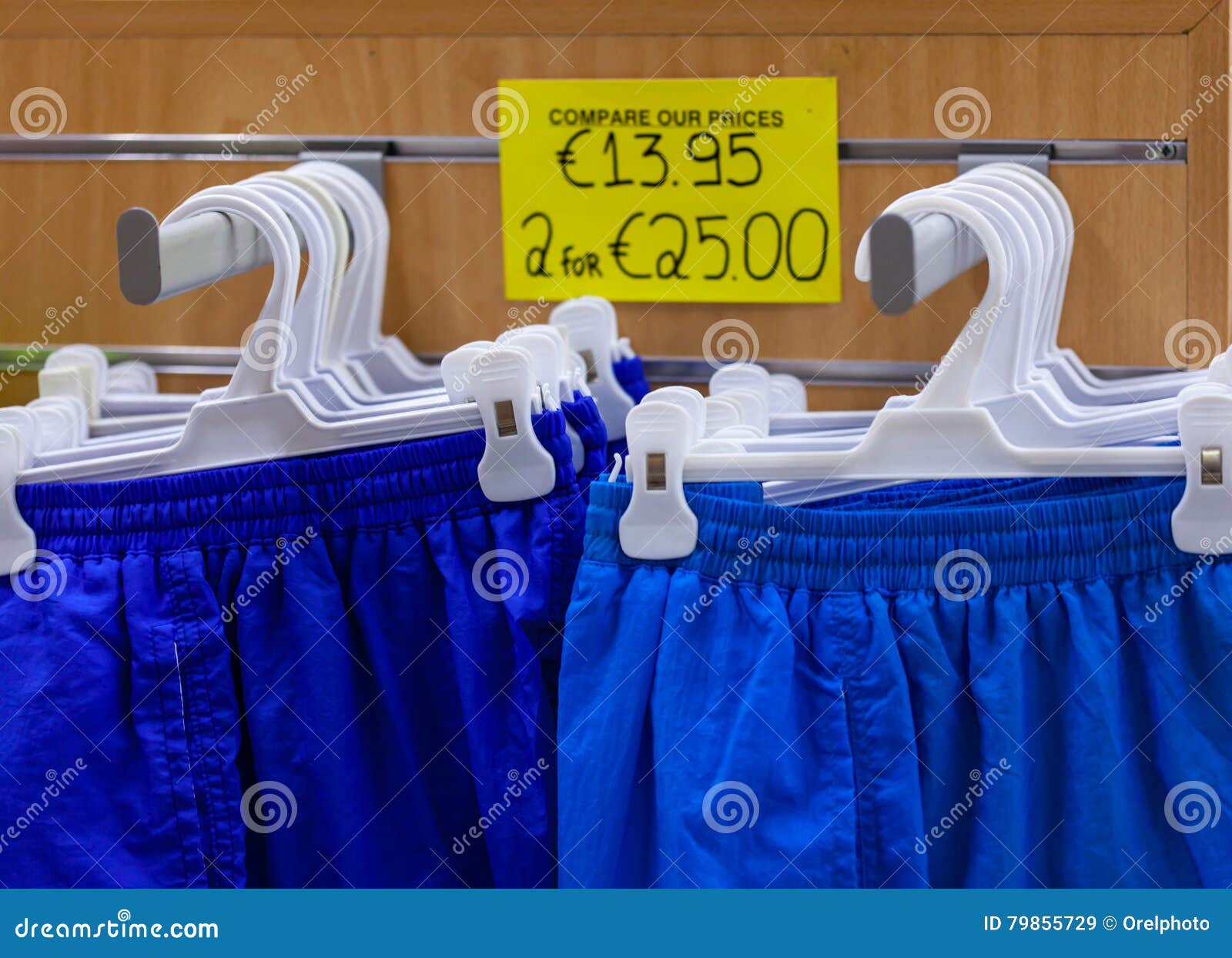 Clothes on Rail in Clothing Store Stock Image - Image of retail ...